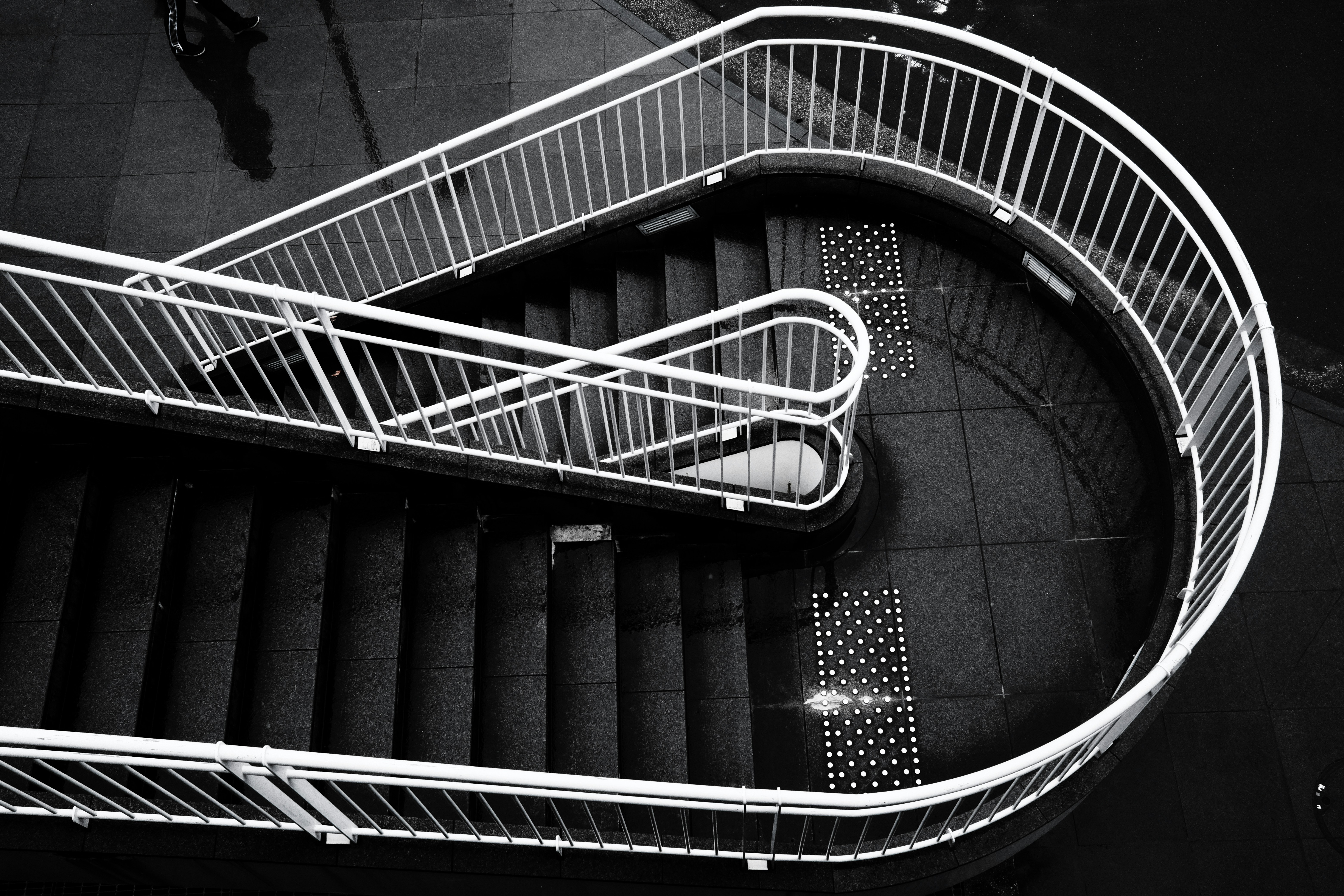 Overhead Spiral: Monochrome Rails and Steps