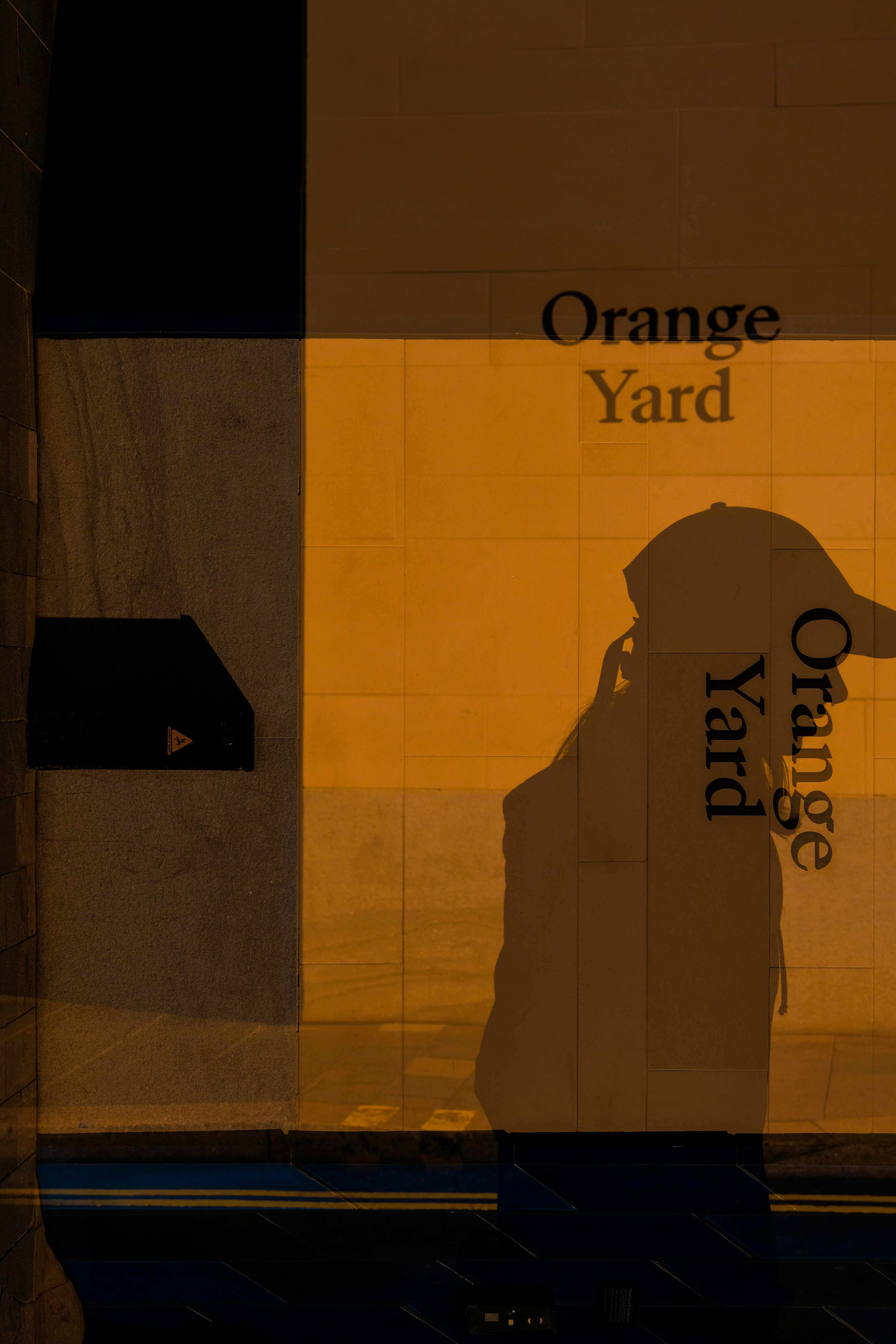 A shadow of a person talking on a cell phone photo – Free London Image ...
