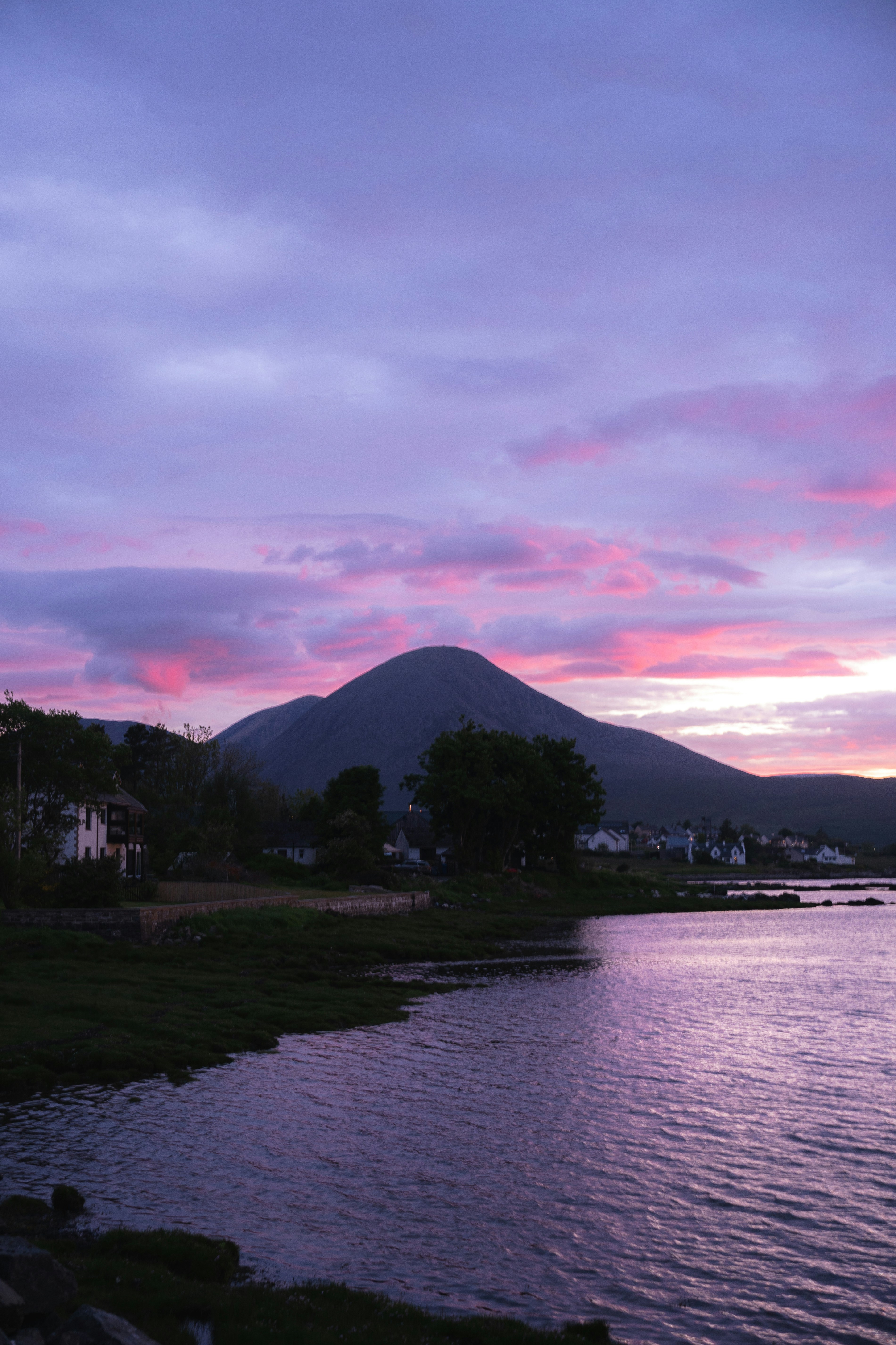A lake with a mountain in the background photo – Free Scenery Image on ...