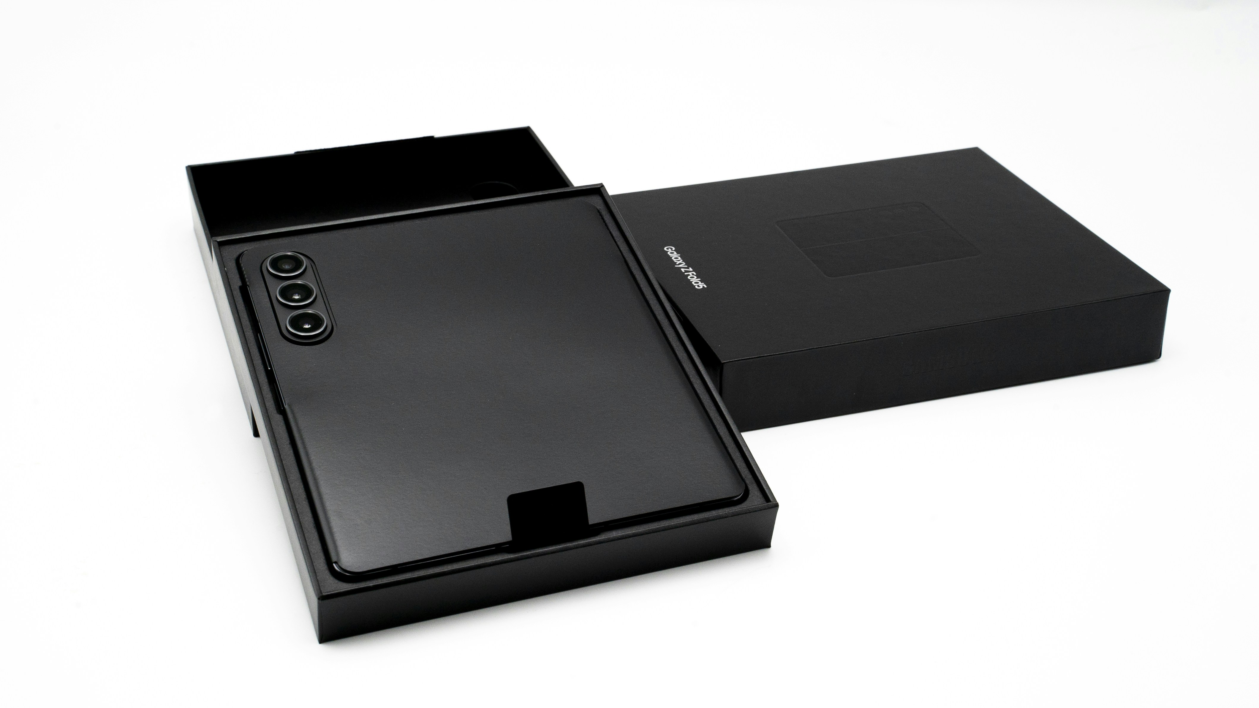 A black box with two buttons on the inside of it photo – Free ...