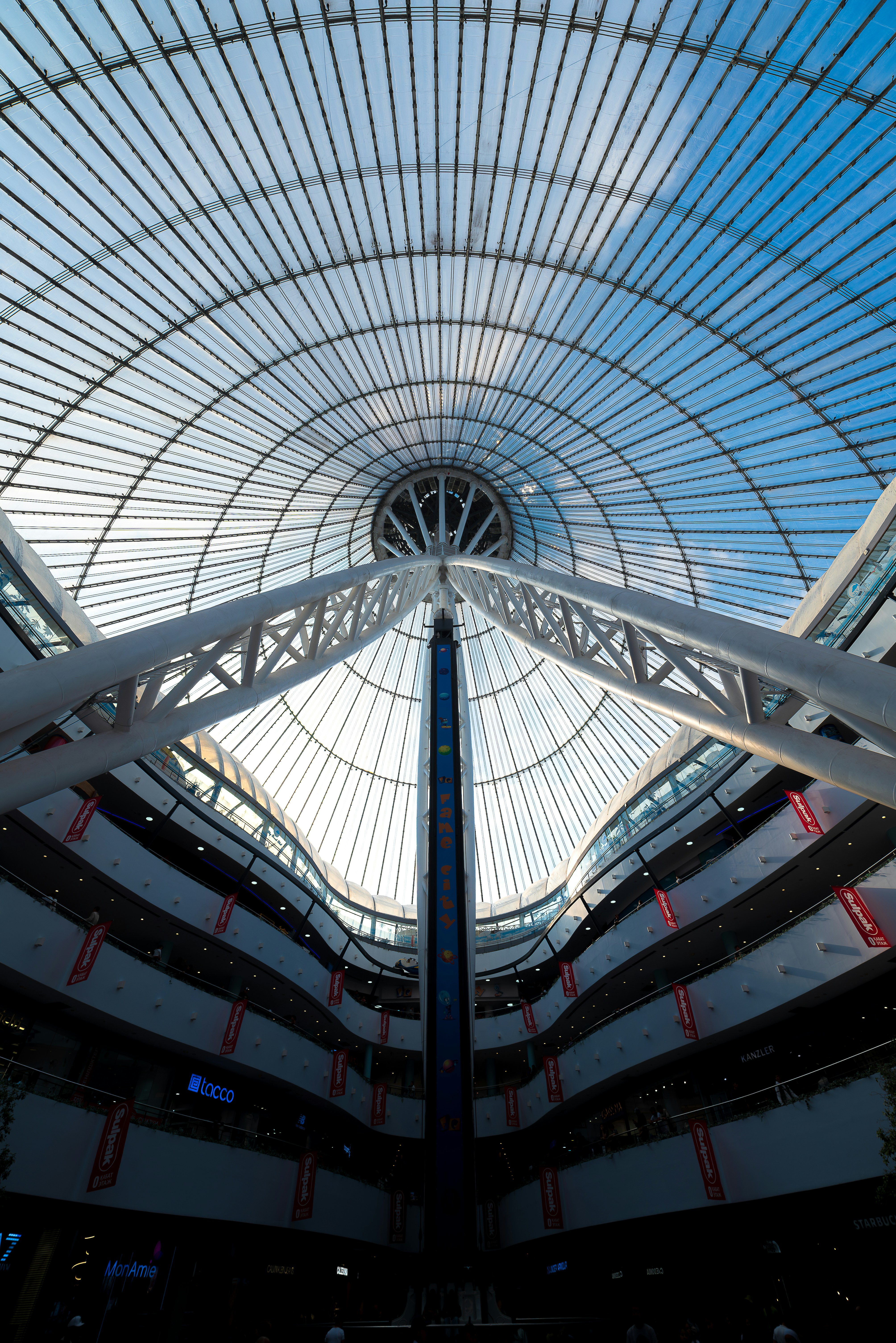 A very tall building with a glass roof photo – Free Astana Image on ...