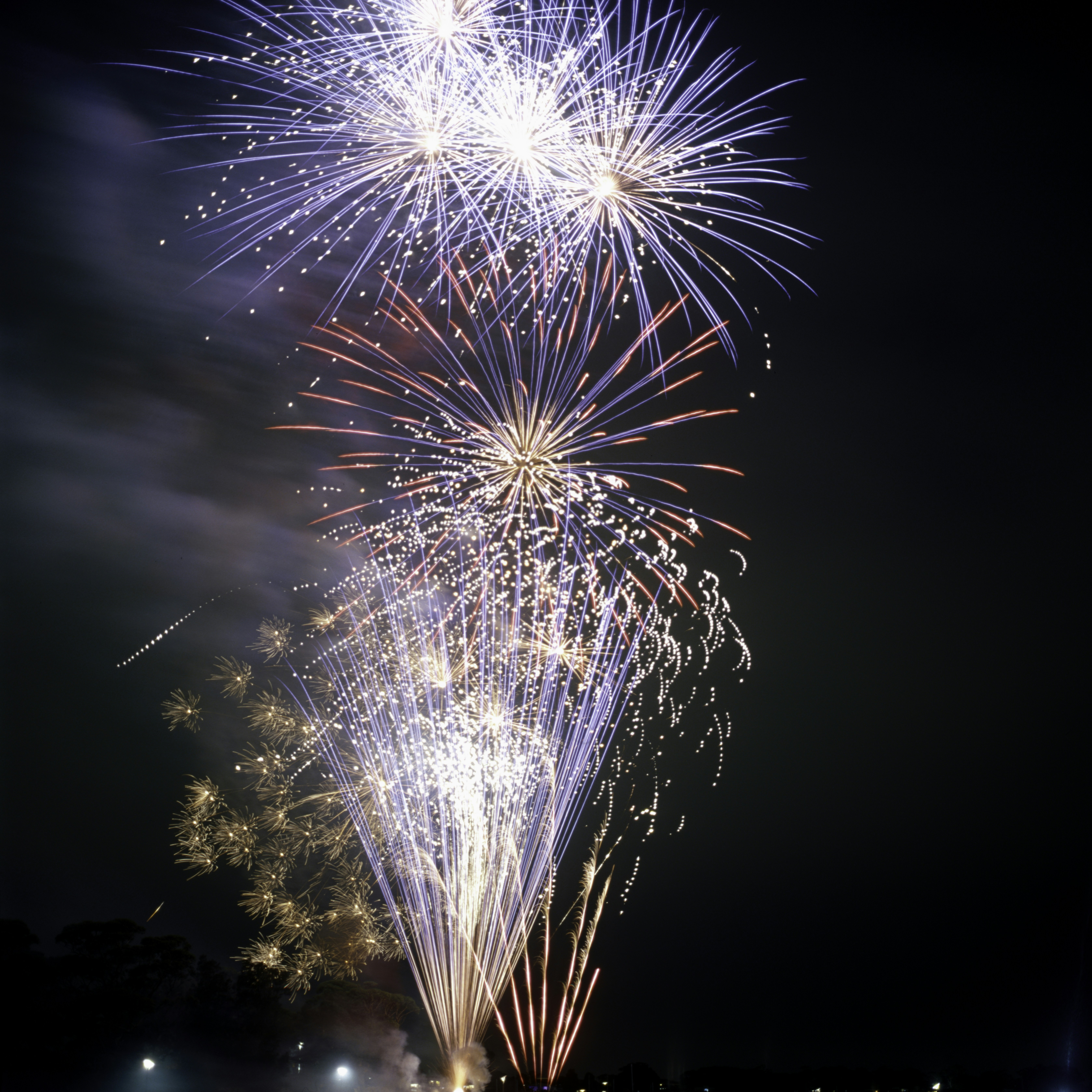 A large fireworks is lit up in the night sky photo – Free Night Image ...