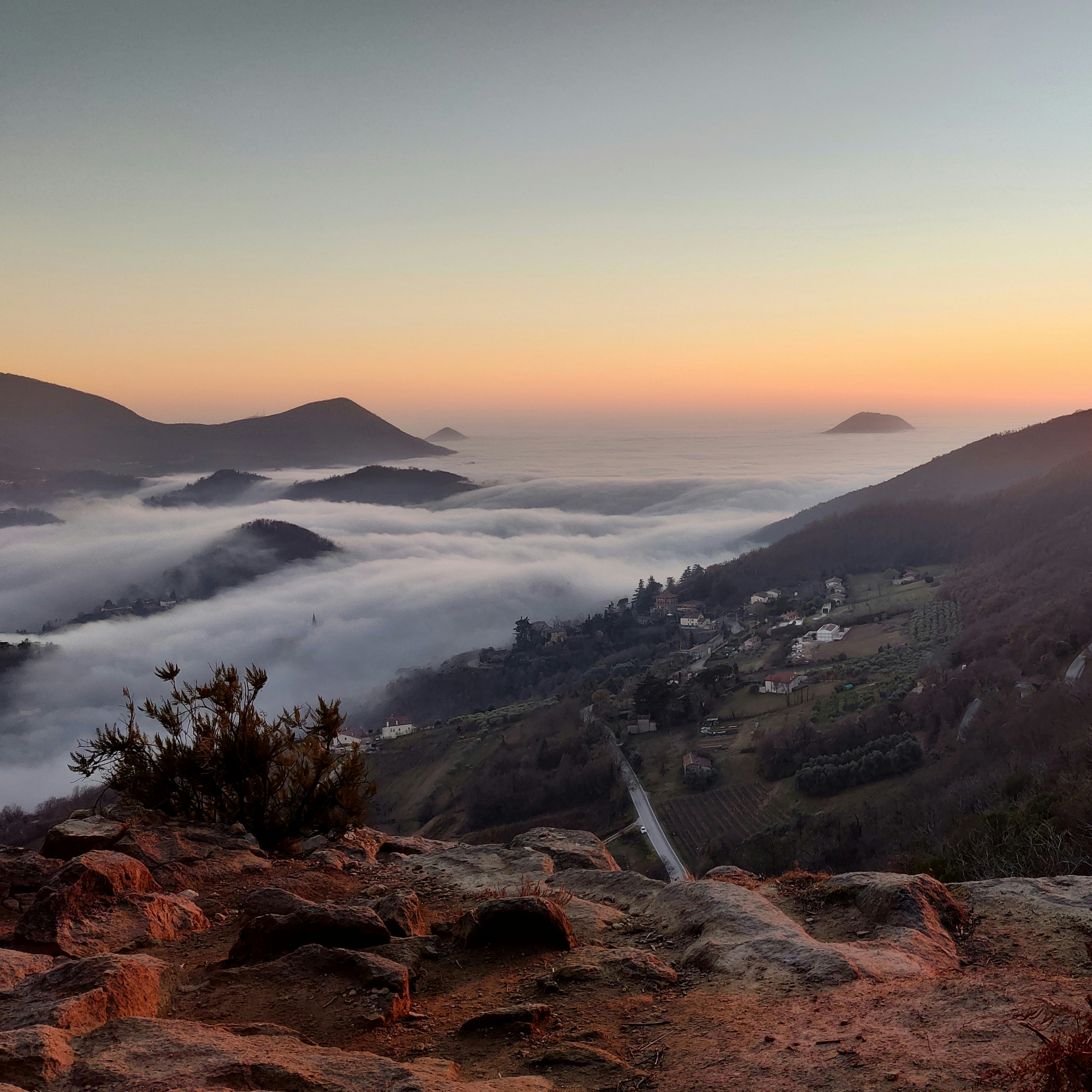 Dawn Mist Over Terraced Valleys: Ridge and Village in Quiet Light