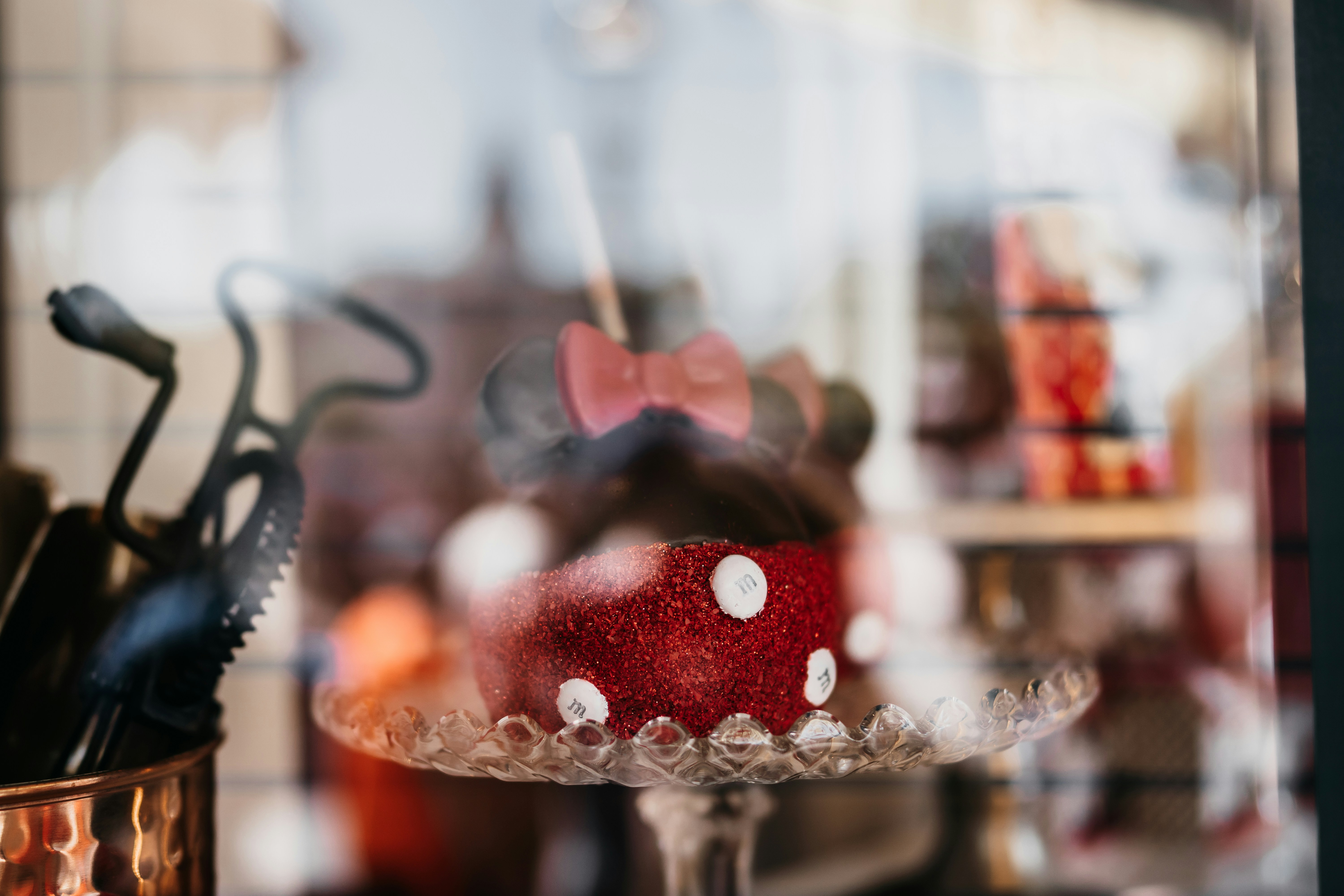 Polka-Dot Red Cake in a Glass Display