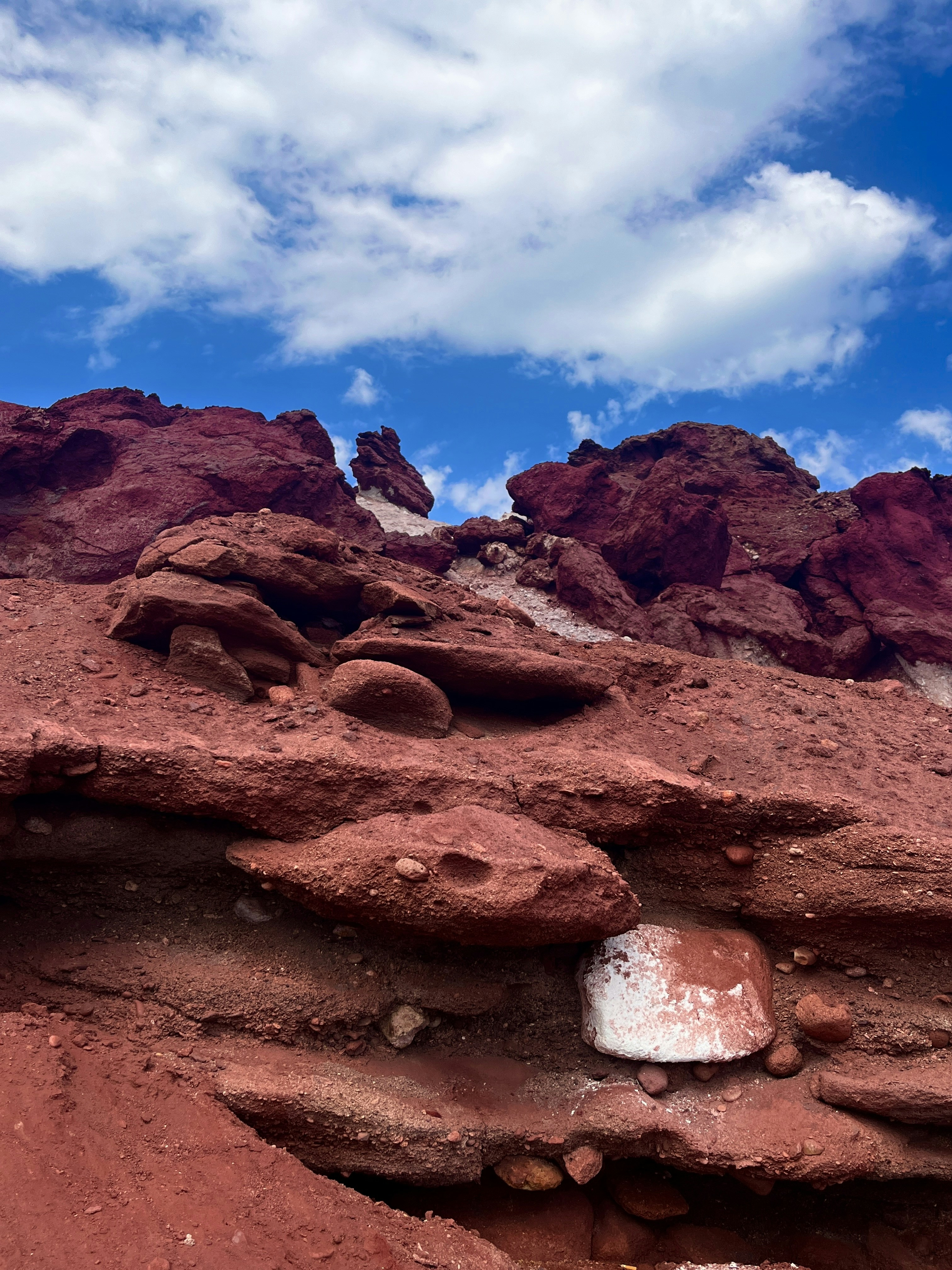 A rock formation with a blue sky in the background photo – Free Rock ...