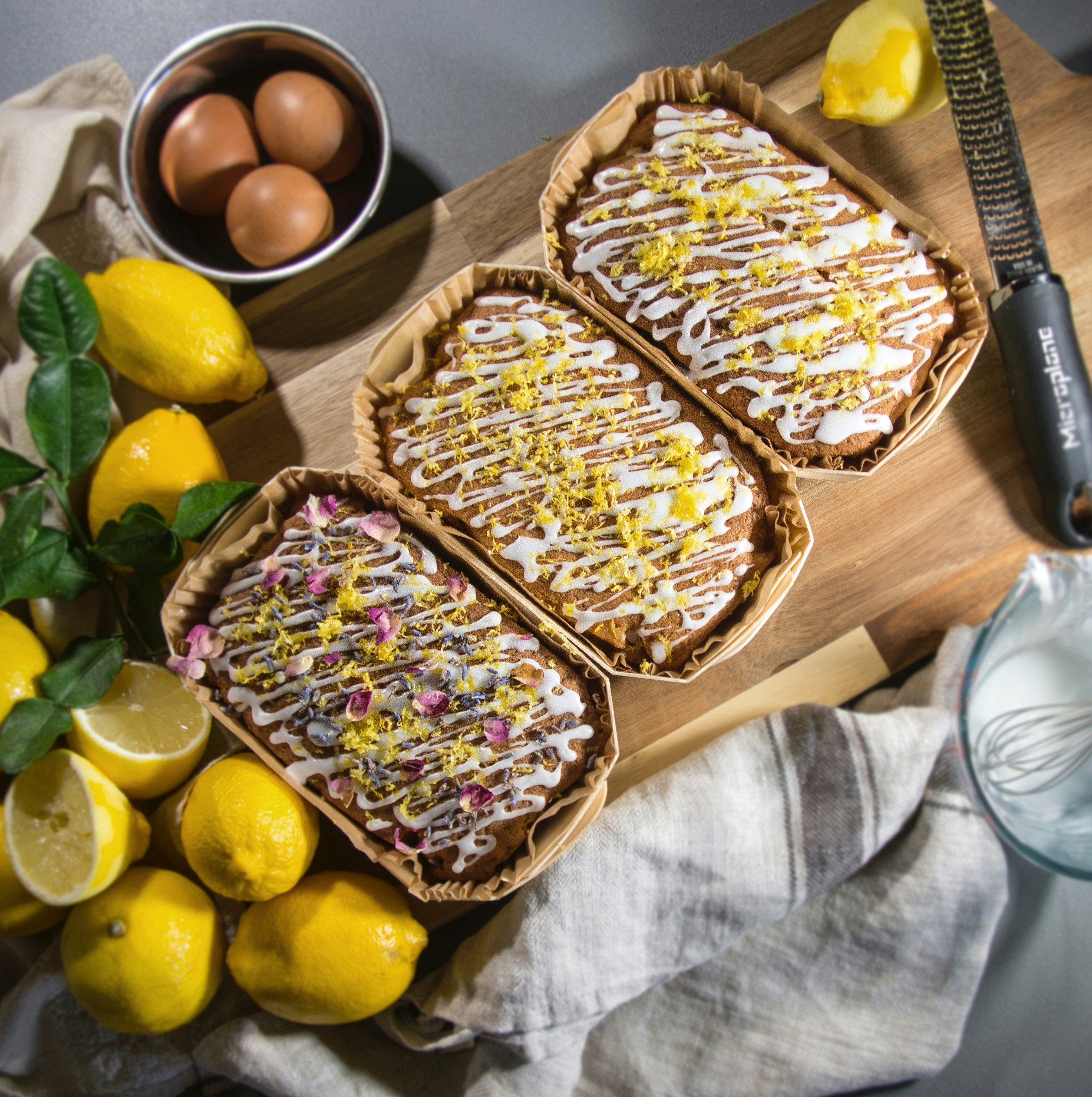 Citrus-cut Trio: Drizzled Tartlets on a Rustic Board