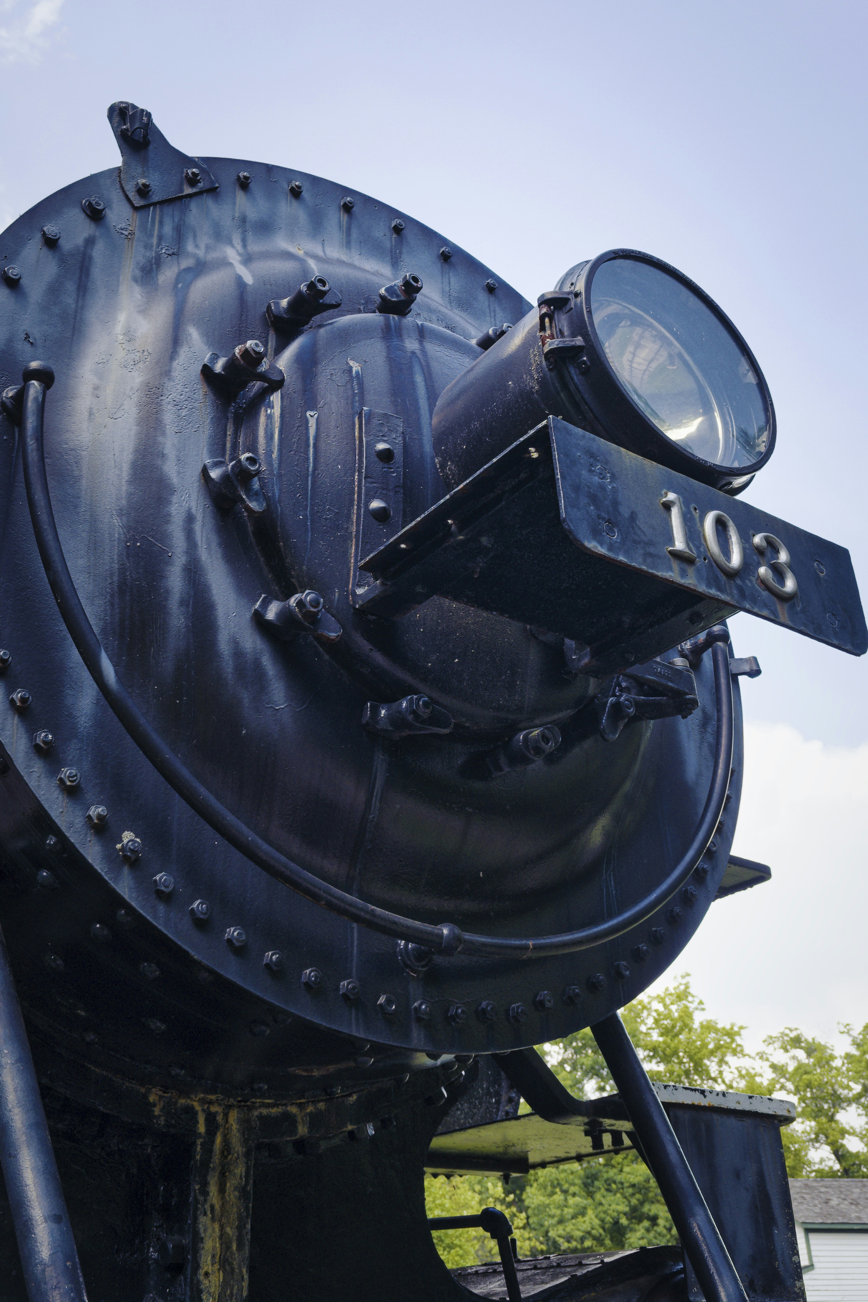 Steel Sentinel: Close-Up of a 103 Steam Locomotive Headlamp