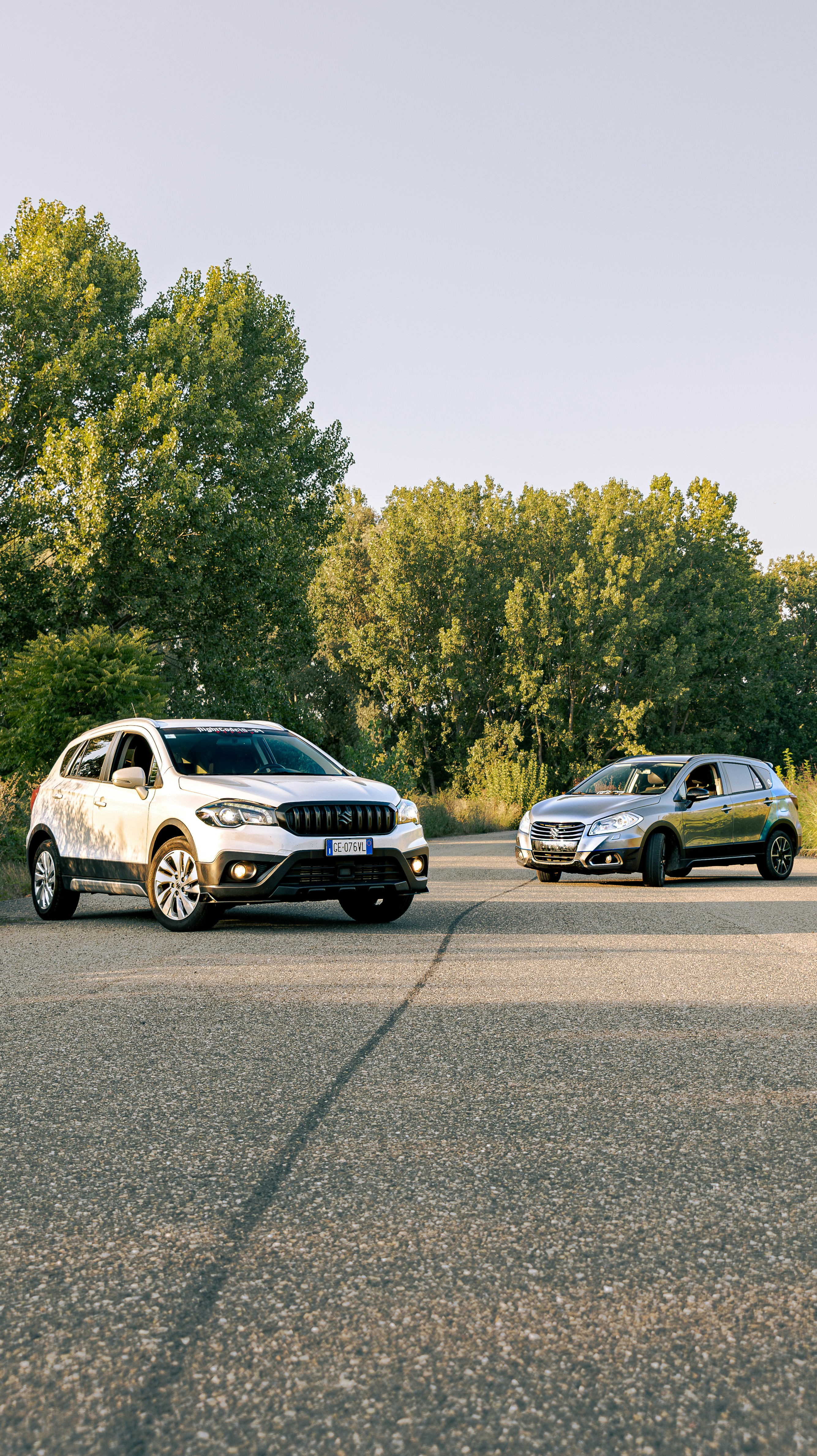 Sunlit Showdown: Cars in Contrast