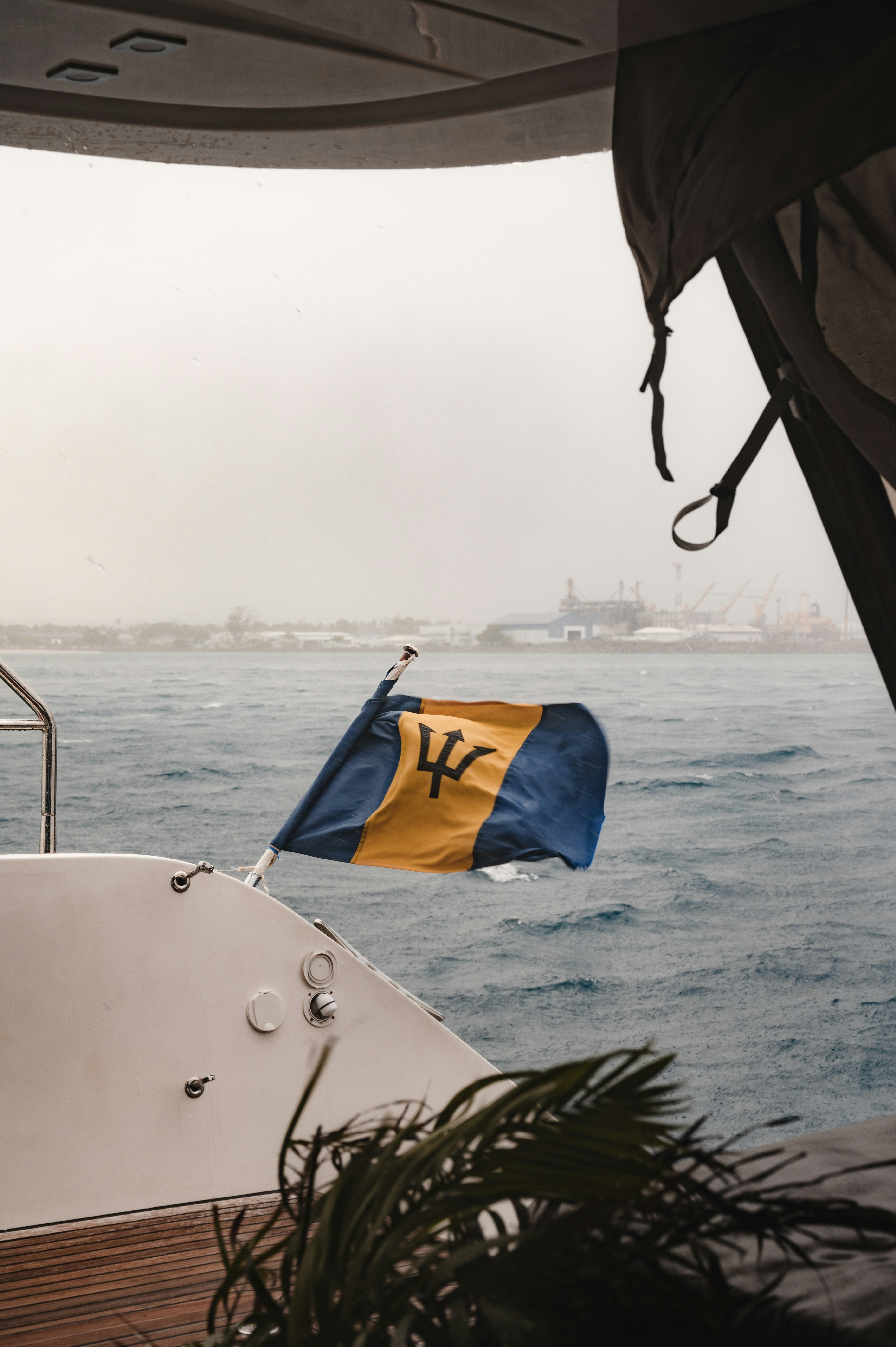 a flag on a boat in the water
