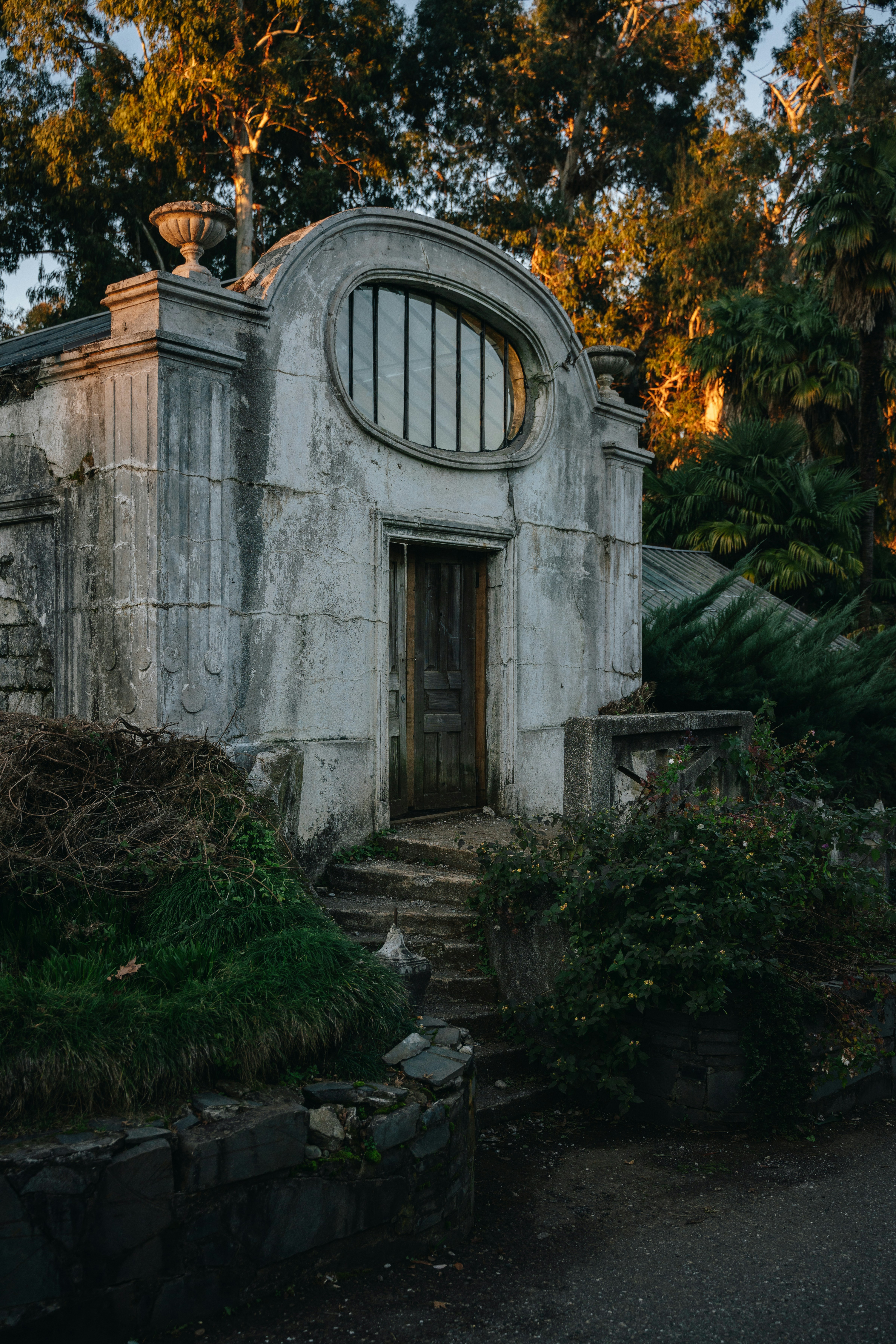 Dusk over the Mossed Gatehouse: A Quiet Portal of Stone and Iron