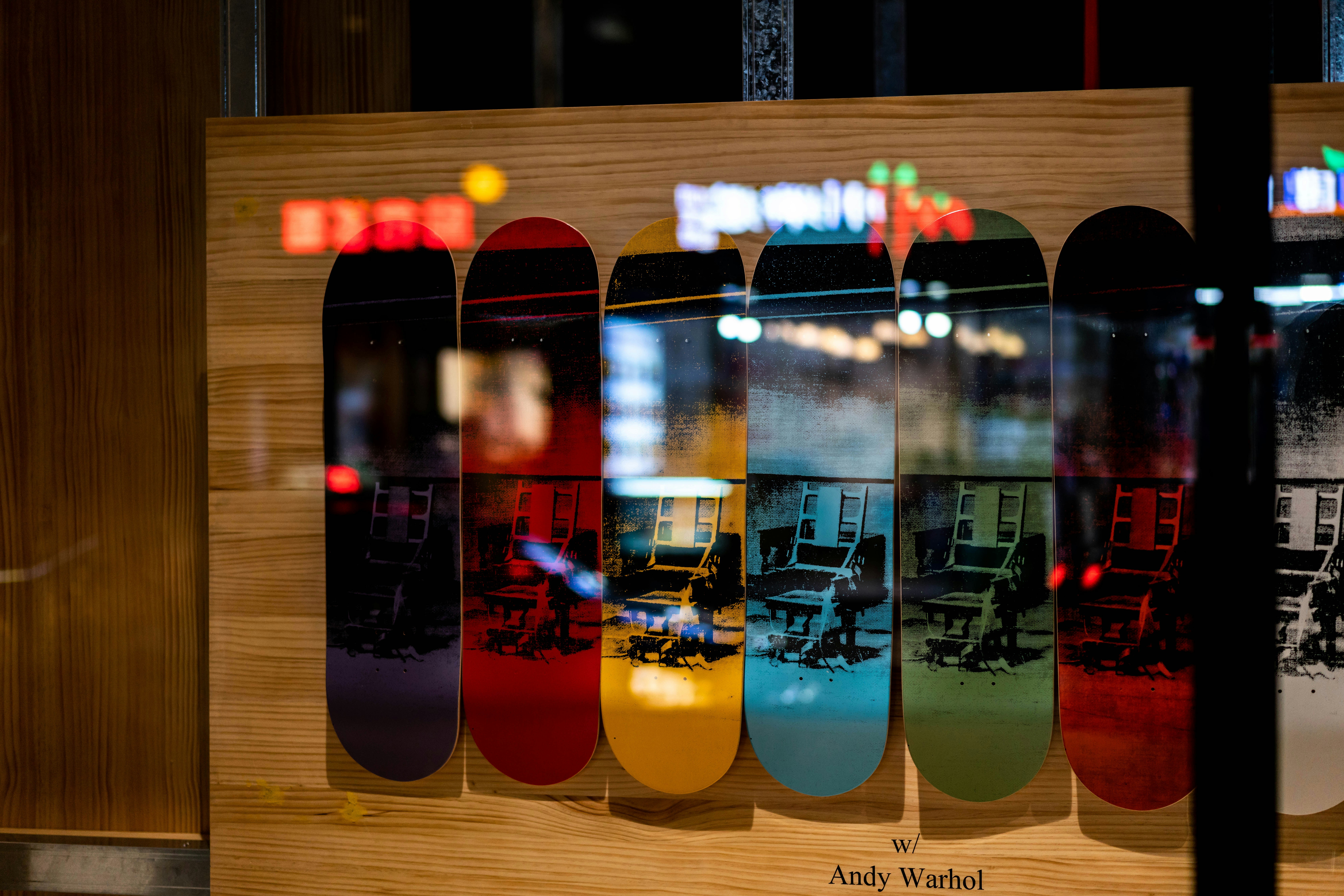 Neon Reflections on an Andy Warhol Skateboard Montage