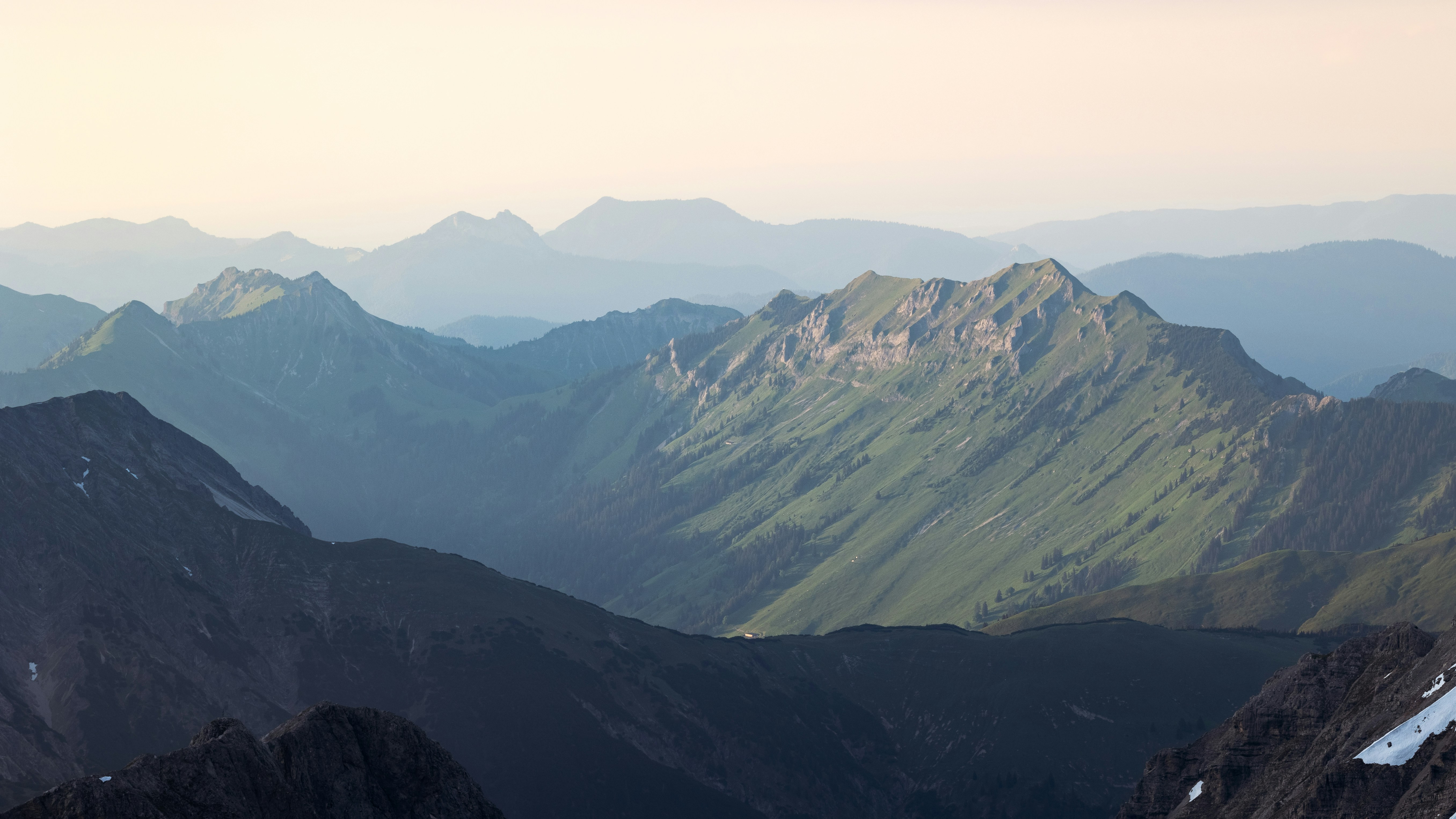 A view of a mountain range from the top of a mountain photo – Free Eng ...