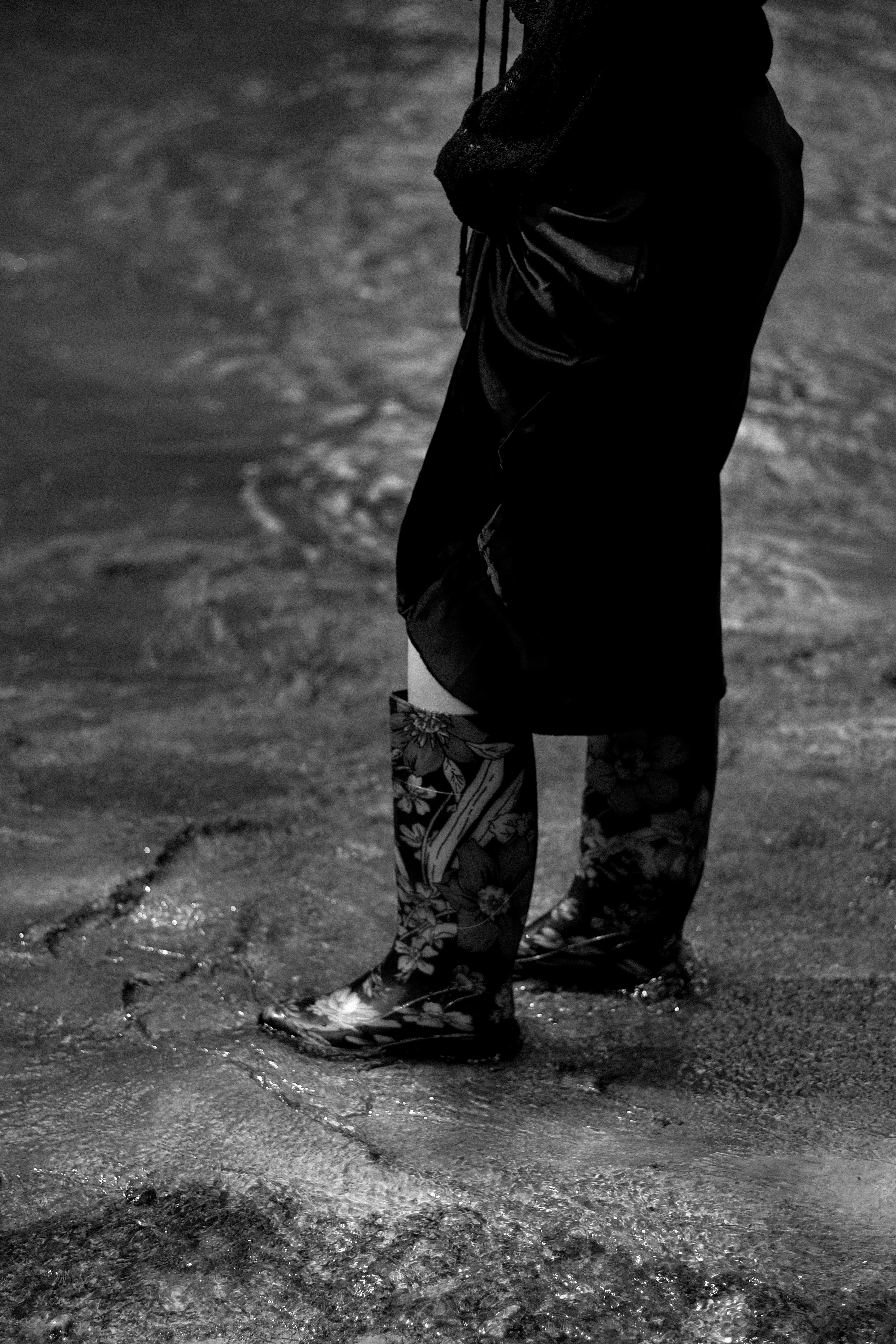 Floral Boots at the Tide: Quiet Steps in Monochrome