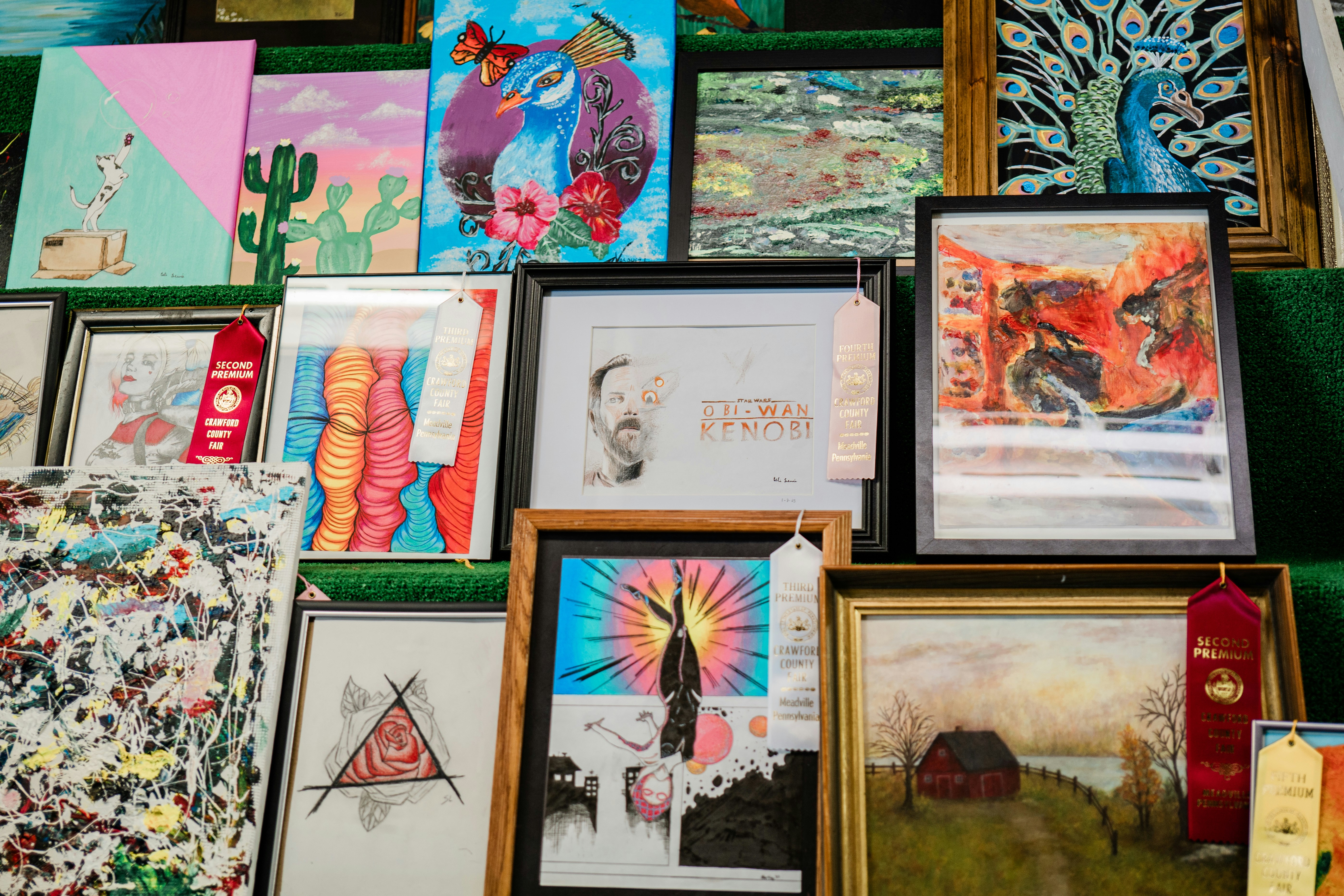 A bunch of paintings and pictures on a wall photo – Free Art Image on ...