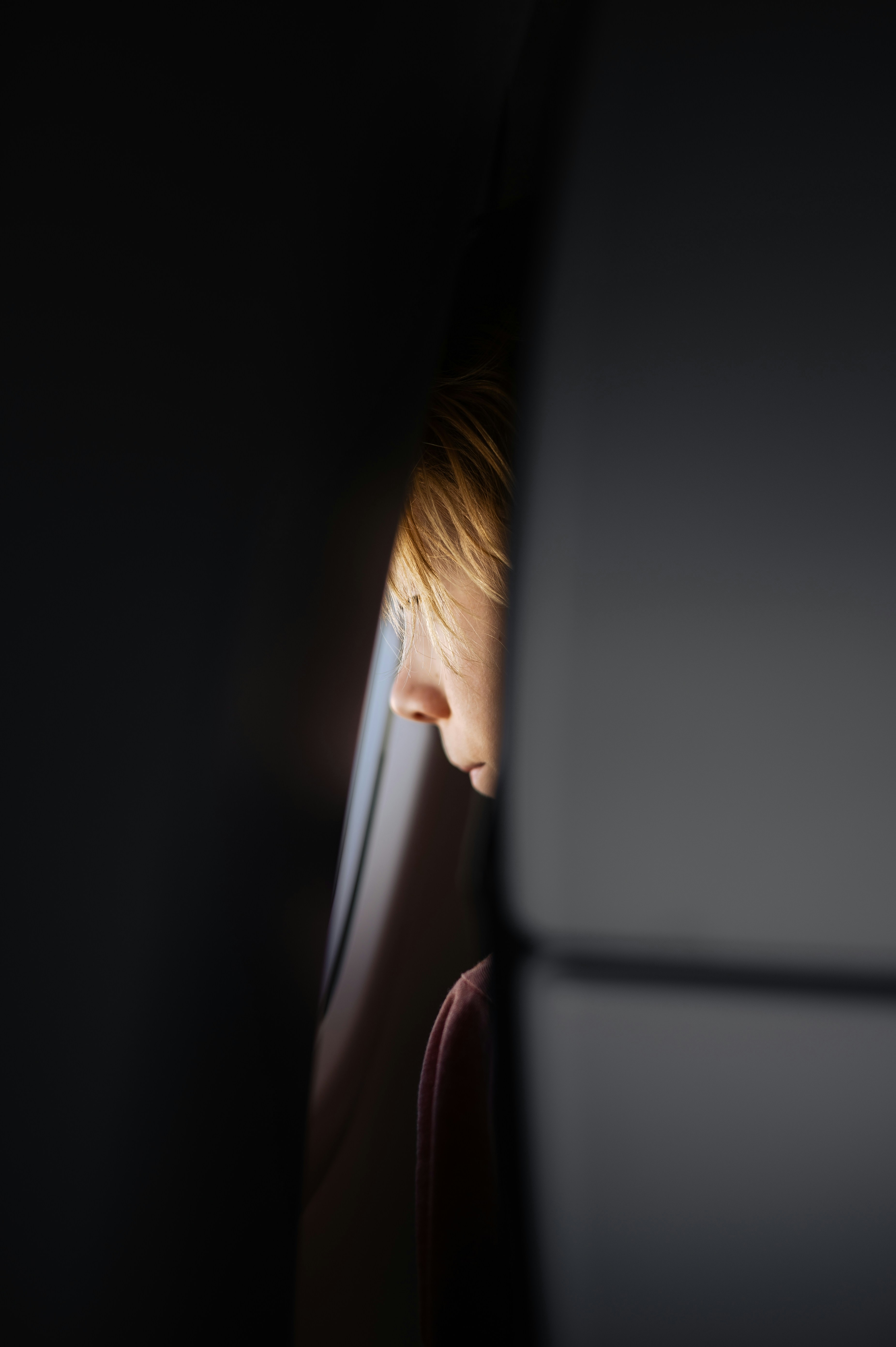 The Narrow View: A Soft-Edge Portrait in a Sliver of Light