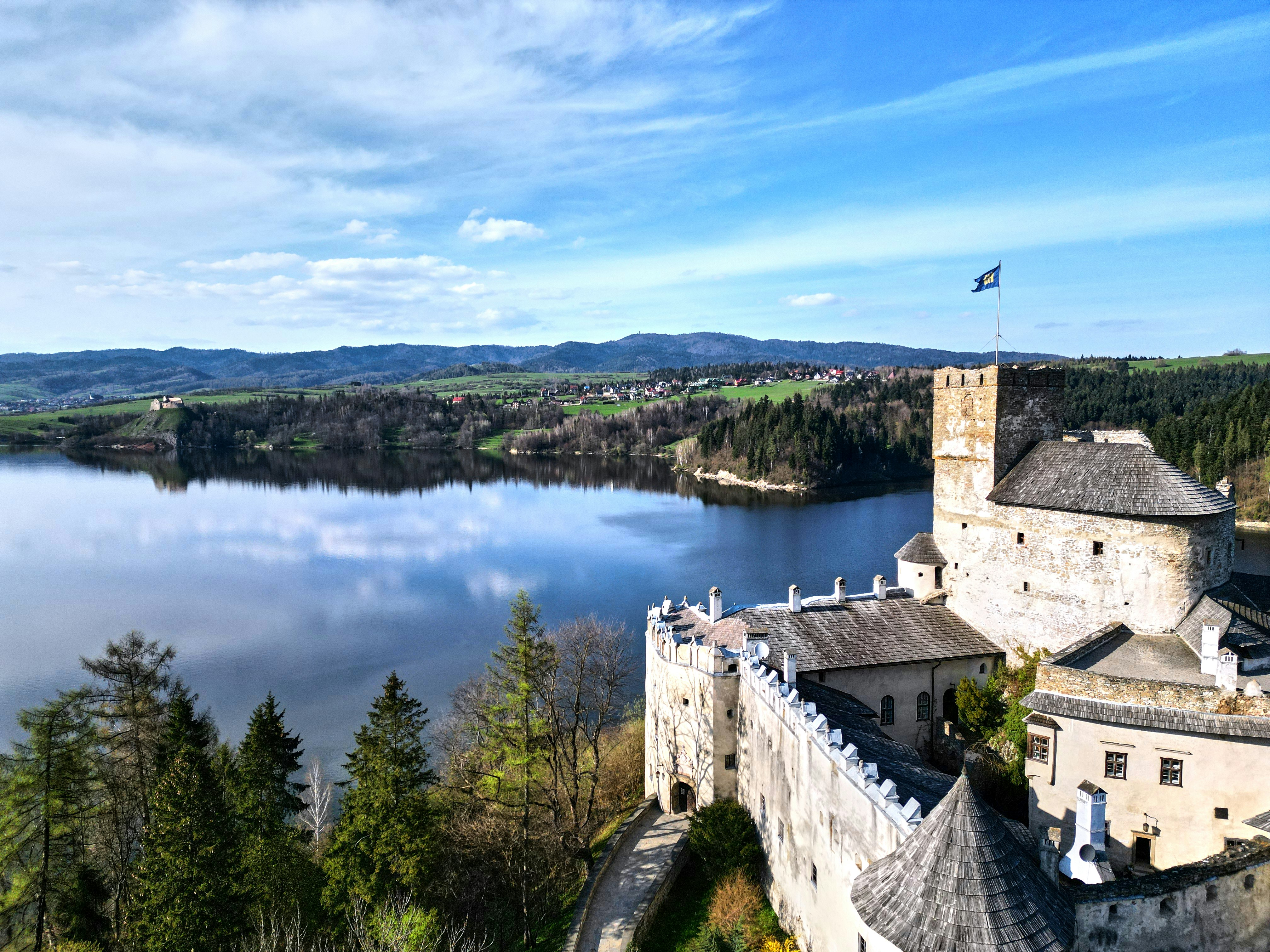 Citadel by the Quiet Lake: Stone Towers on a Mirror Surface