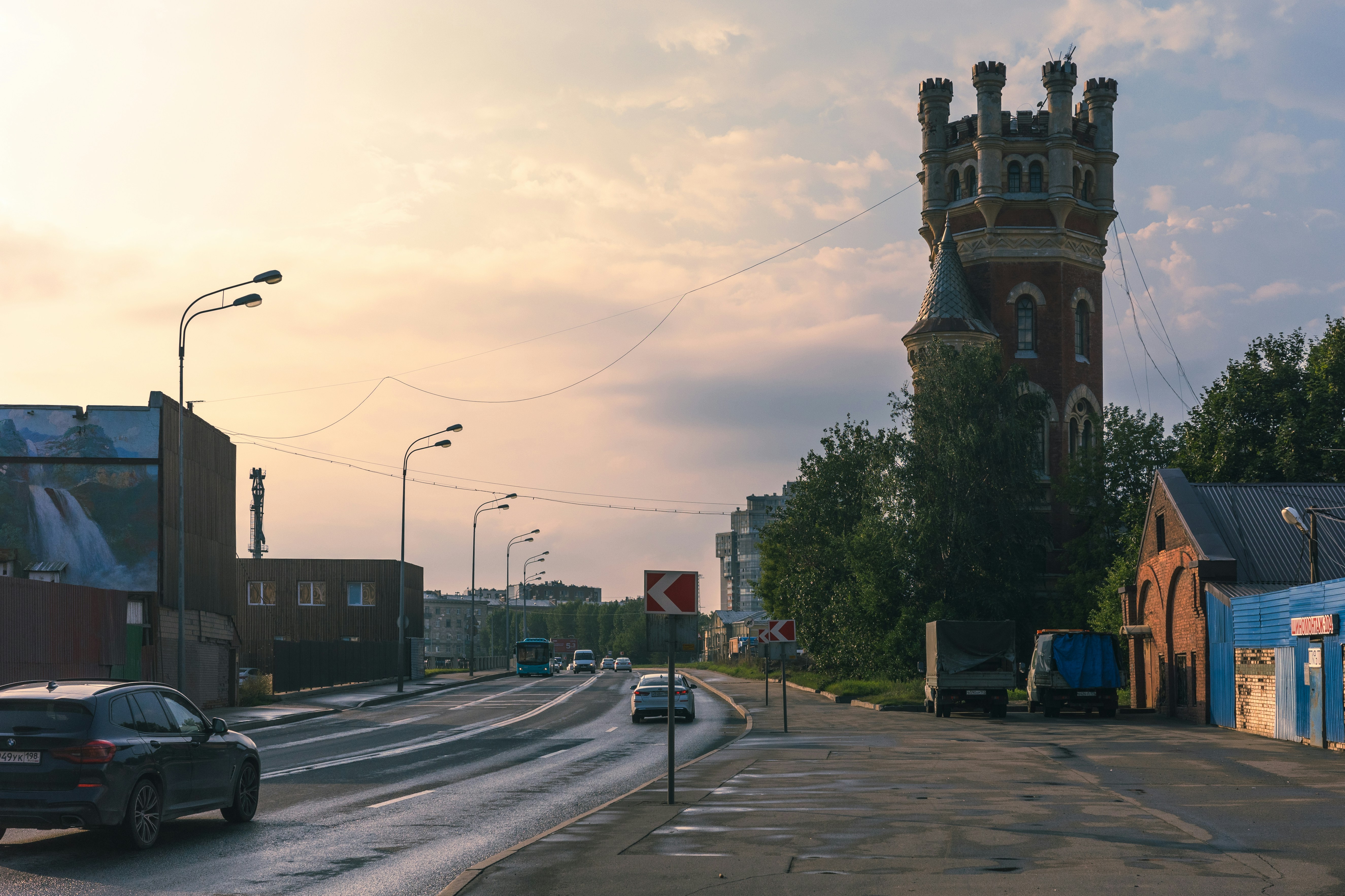 Towering on the Edge: A Quiet Town Street toward a Brick Turret