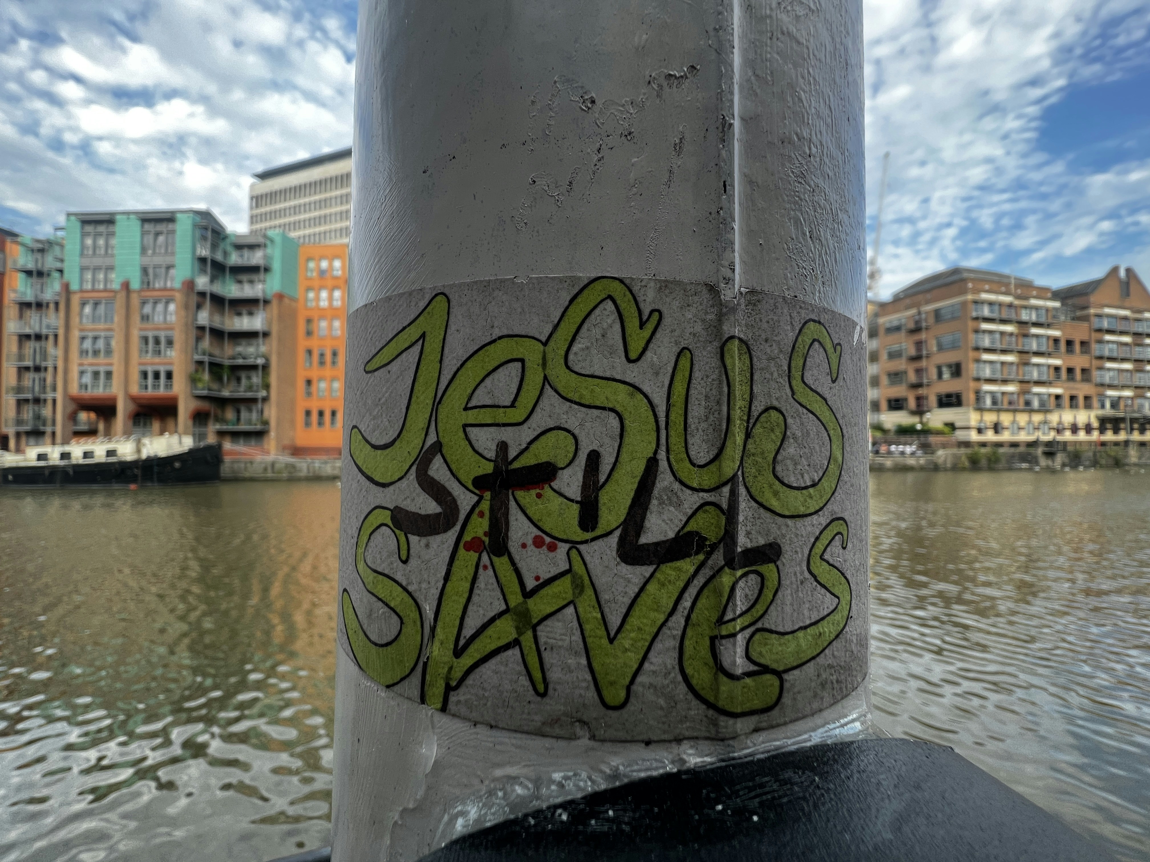 Jesus on the Pillar: A Riverfront Graffiti Moment