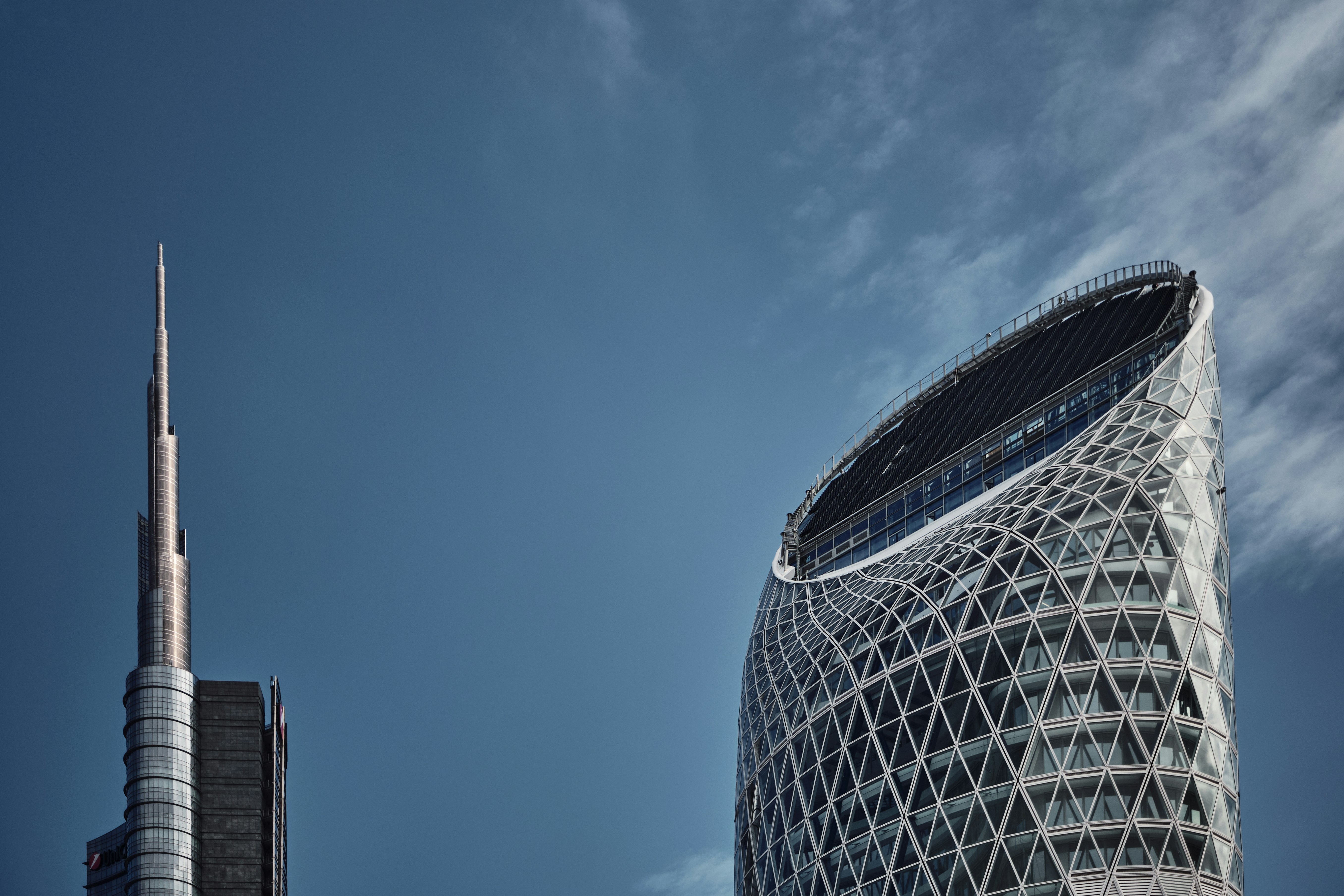 A very tall building next to a very tall building photo – Free Milano ...