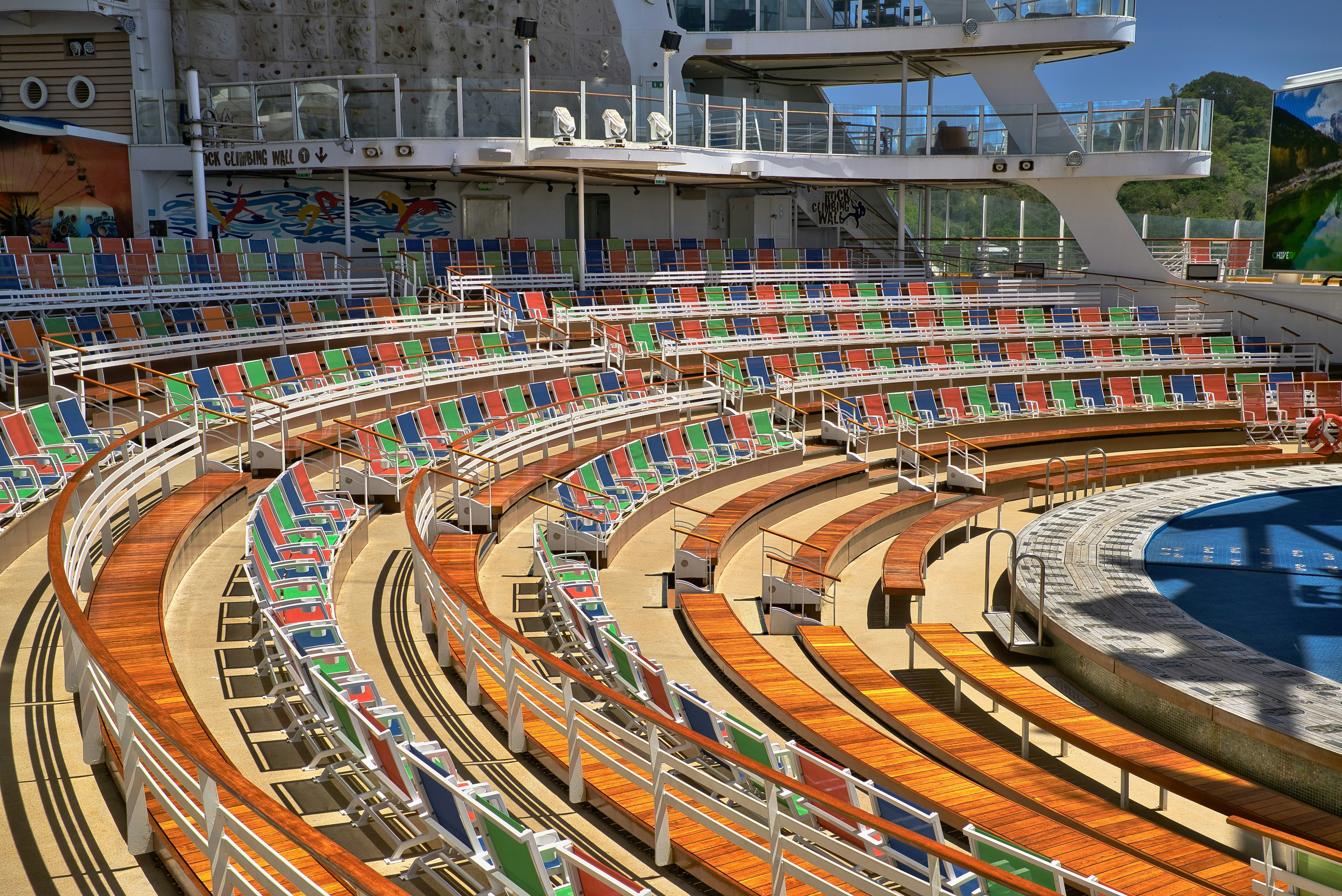 A cruise ship with a lot of chairs in it photo – Free Stadium Image on ...