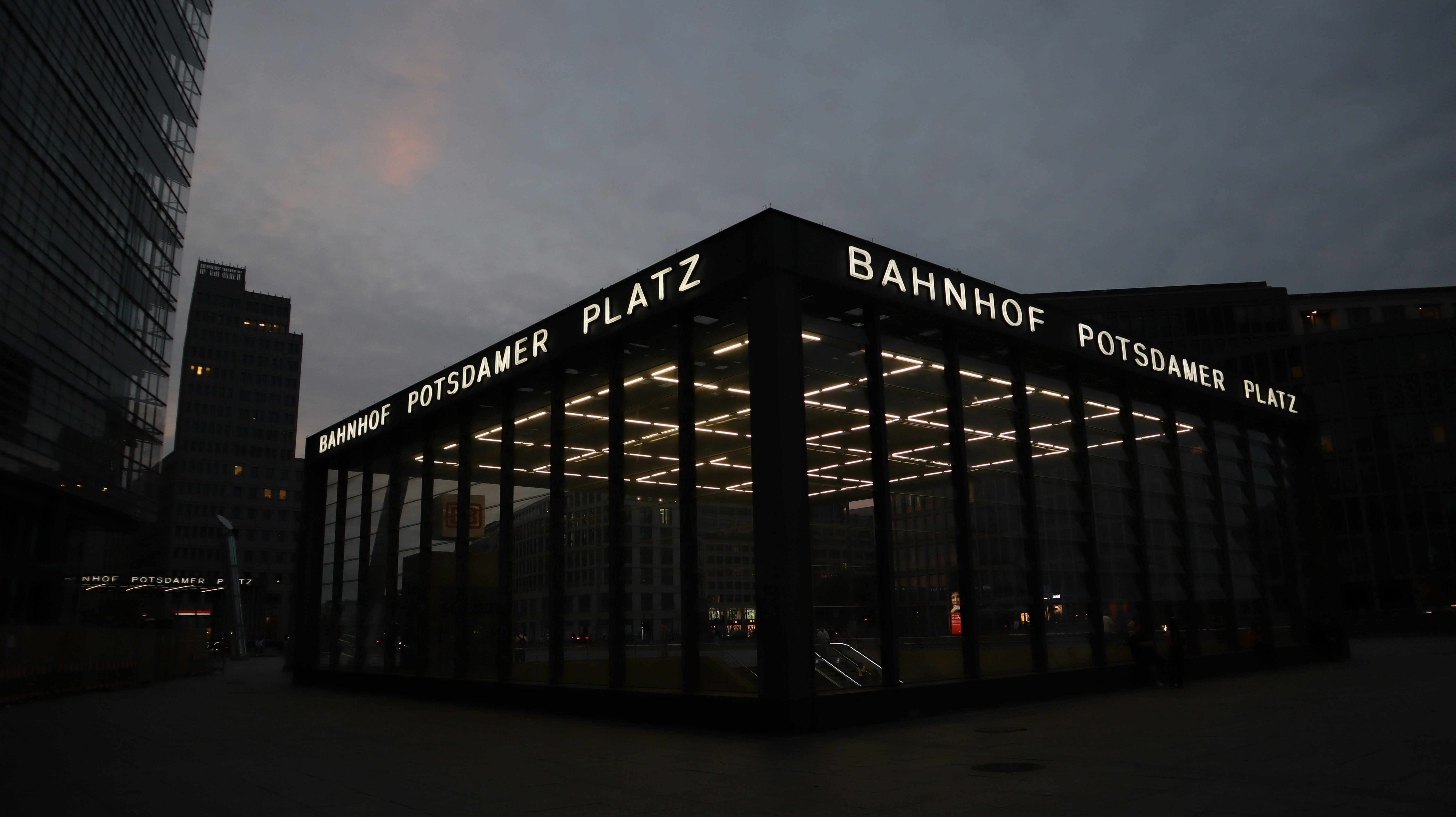 Night Glass Pavilion at Potsdamer Platz: Quiet Neon Edges and a Silent Entrance