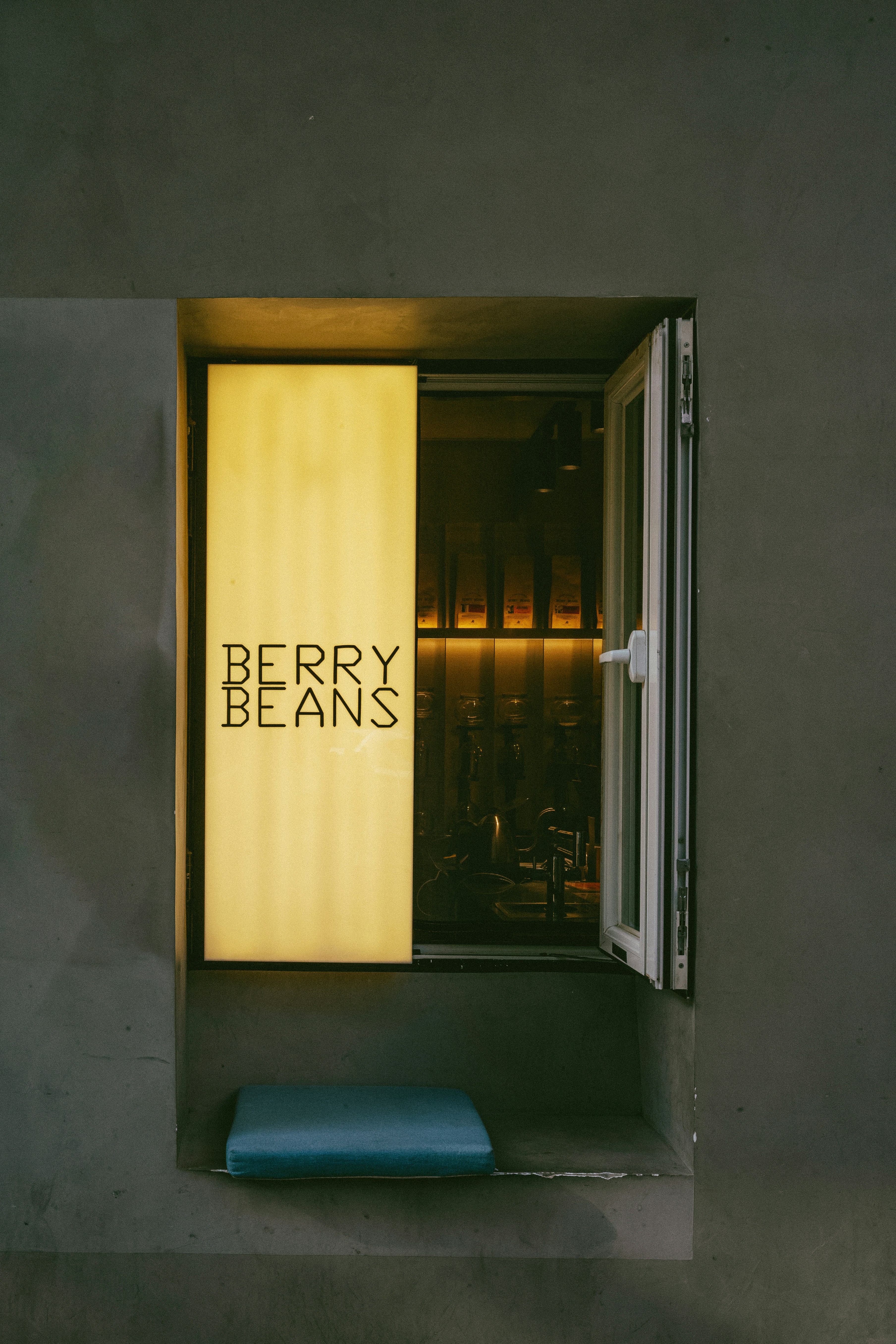 A window with the words berry beans written on it photo – Free Cabinet ...