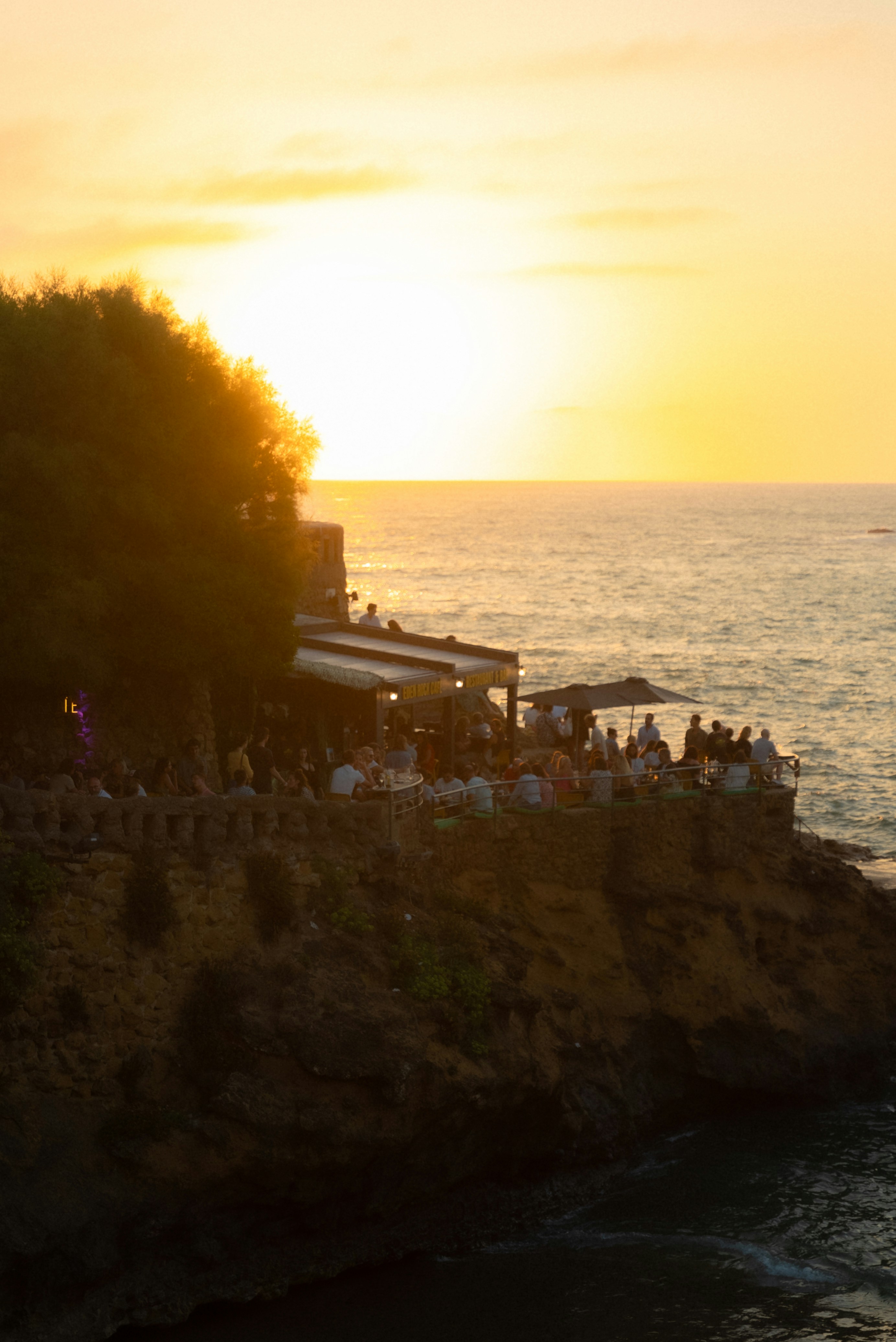Sunset Terrace Overlooking the Cliffside Crowd