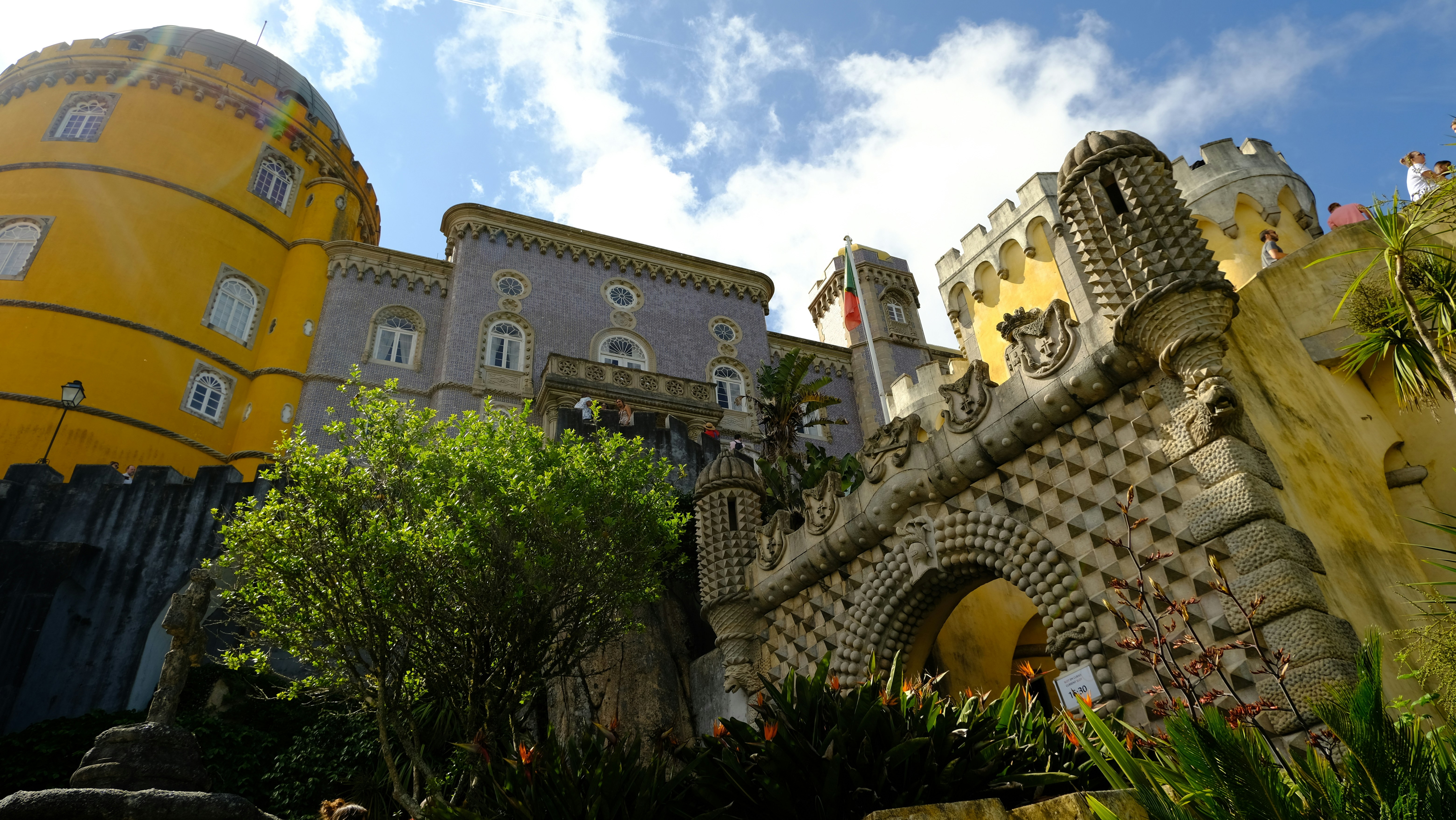 A castle like building with a clock on the top of it photo – Free ...