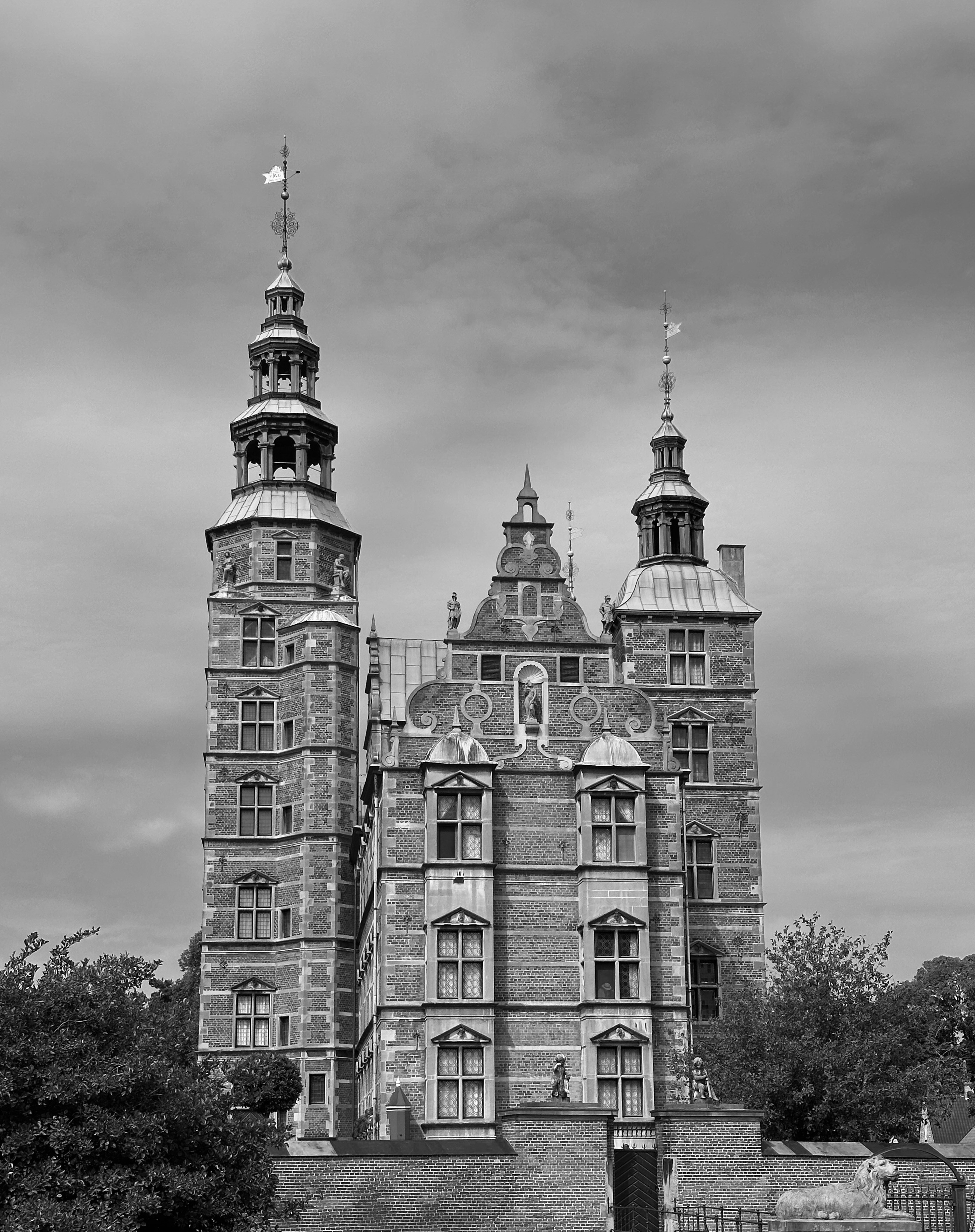 Monochrome Fortress: Twin Towers Framing a Victorian Facade