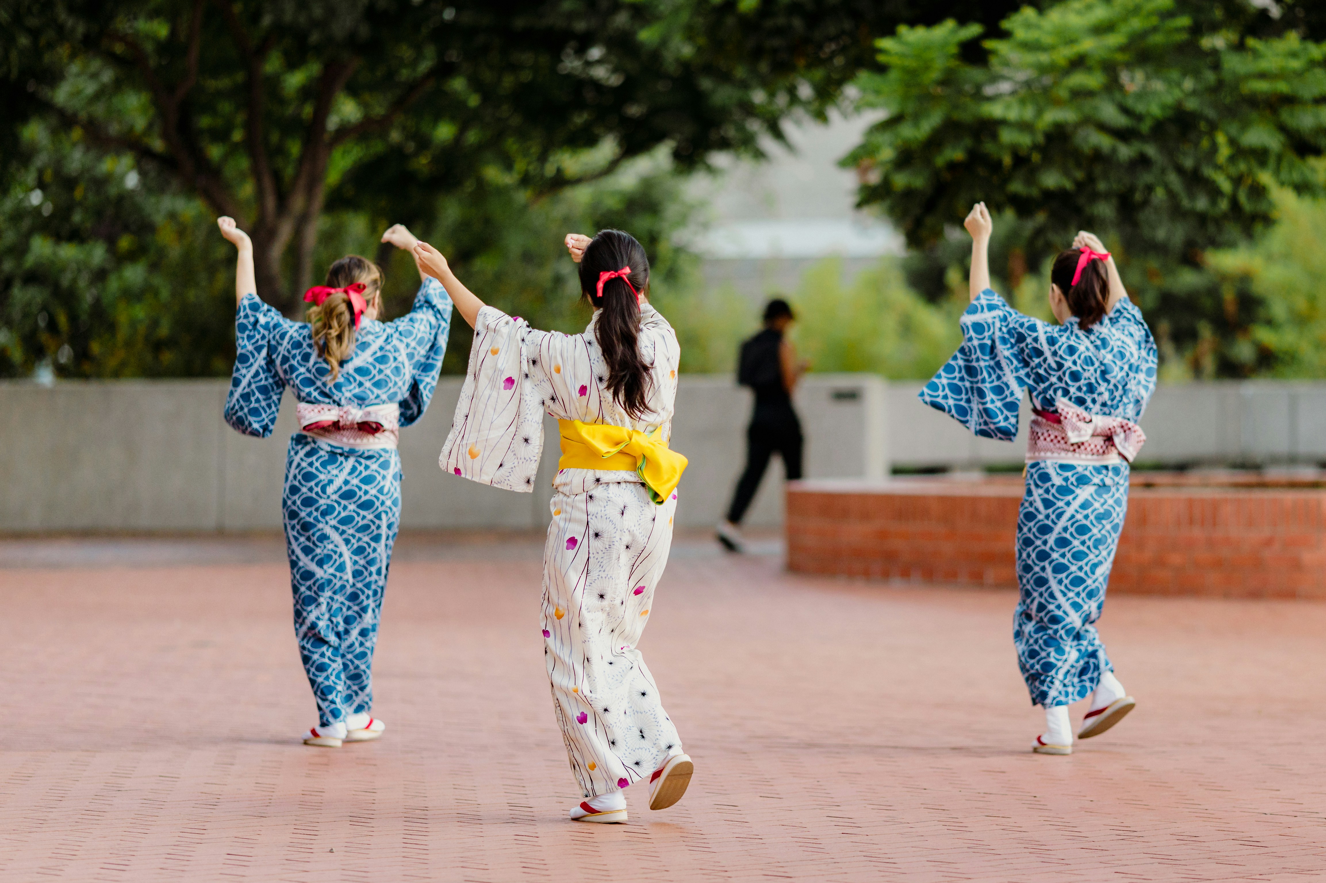 A group of women in kimonos dancing in a courtyard photo – Free Dancing ...