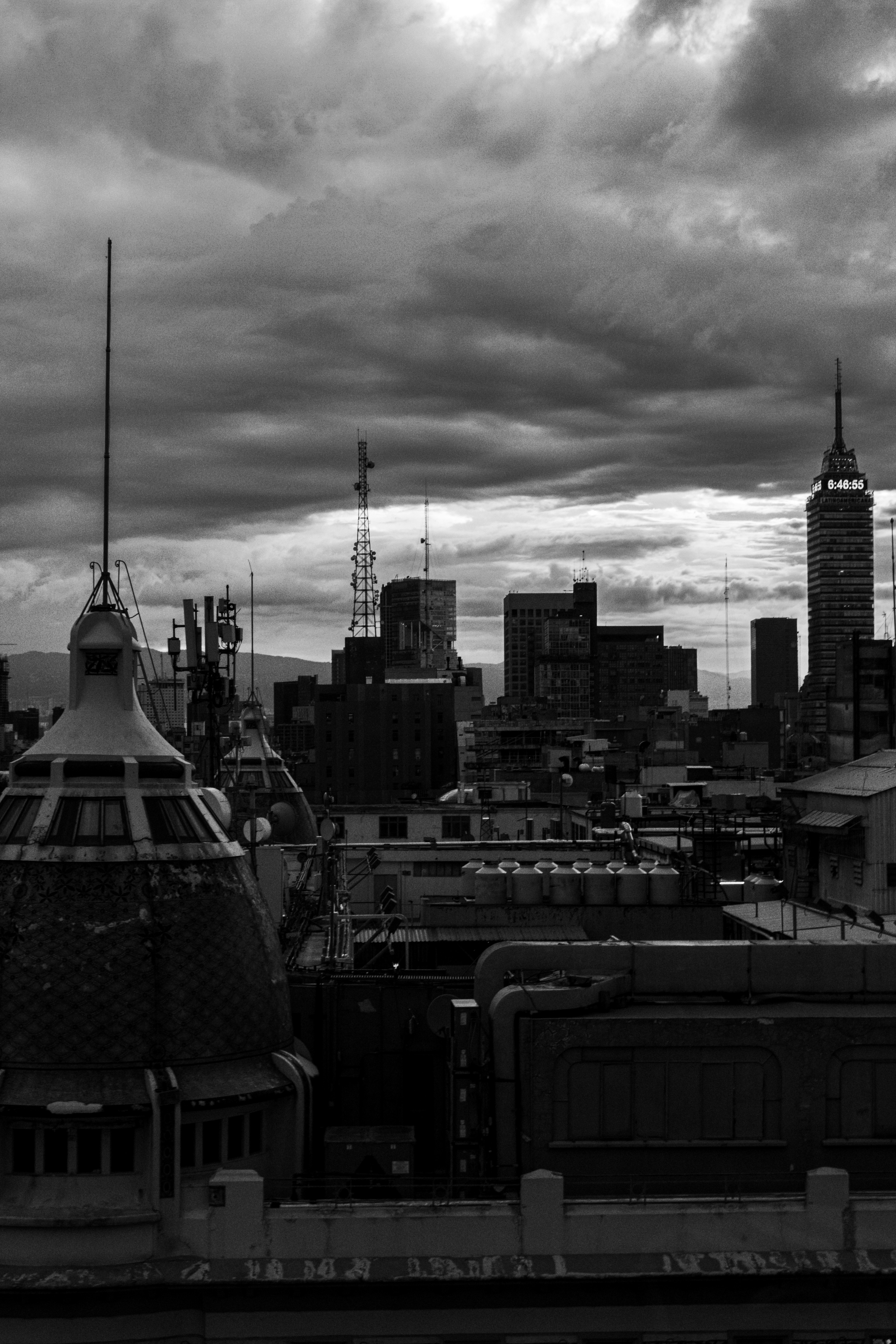 Mexico City landscape in a cloud night. Black and white photography of Mexico City. Torre Latinoamericana in the background