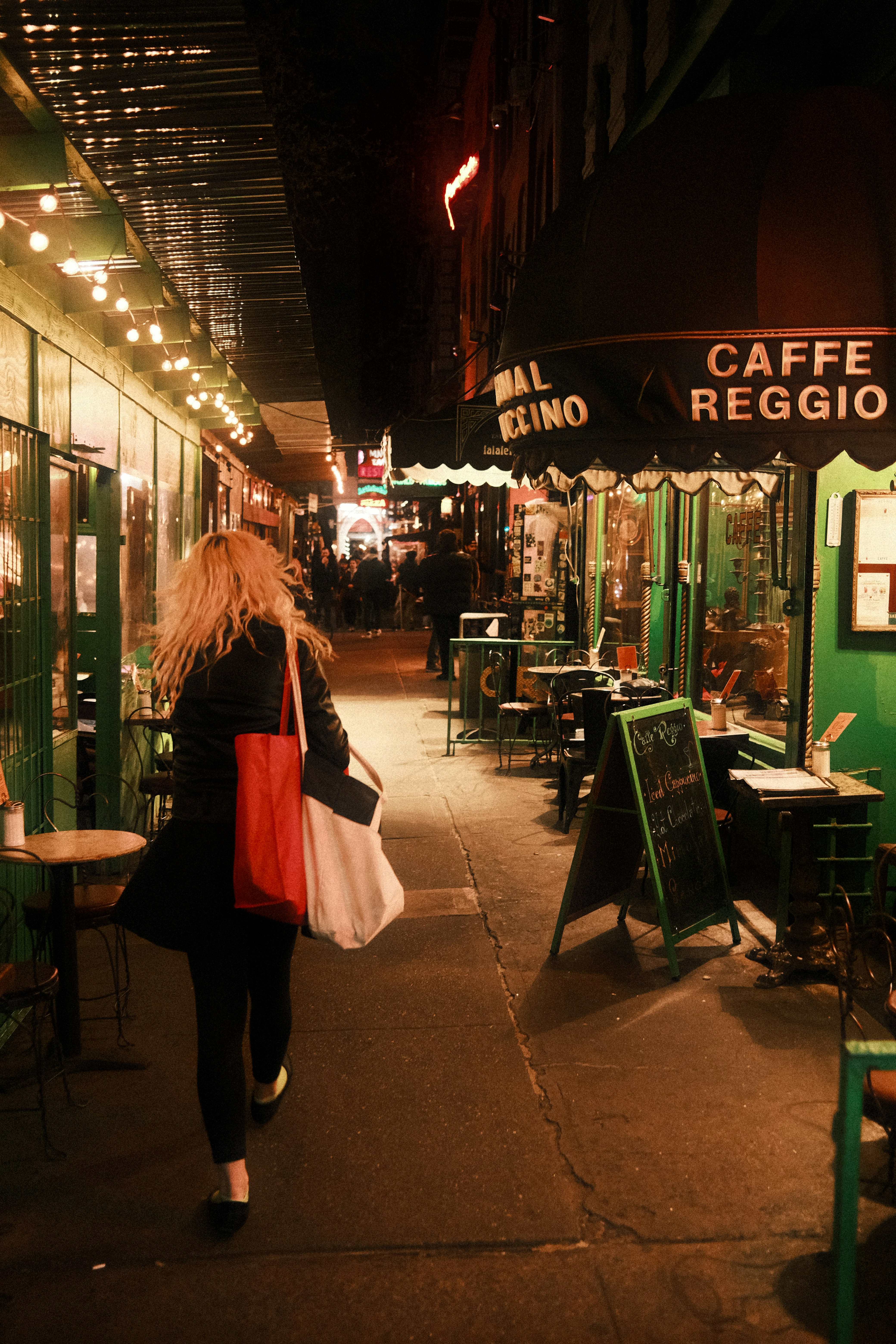 Red Tote, Green Neon: A Night Walk Through a Café Strip