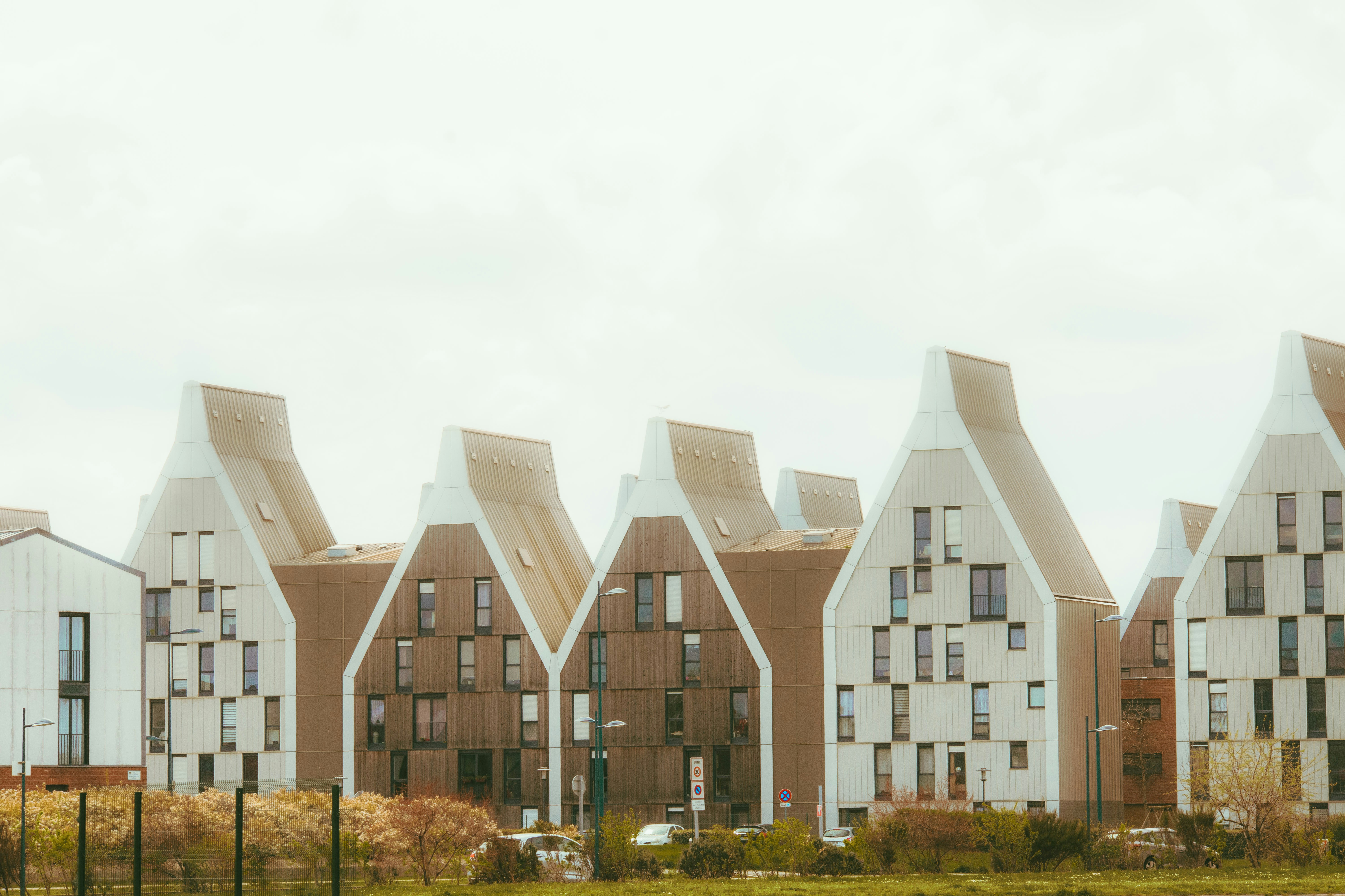 Peaks and Facades: A Row of Timbered Gabled Homes