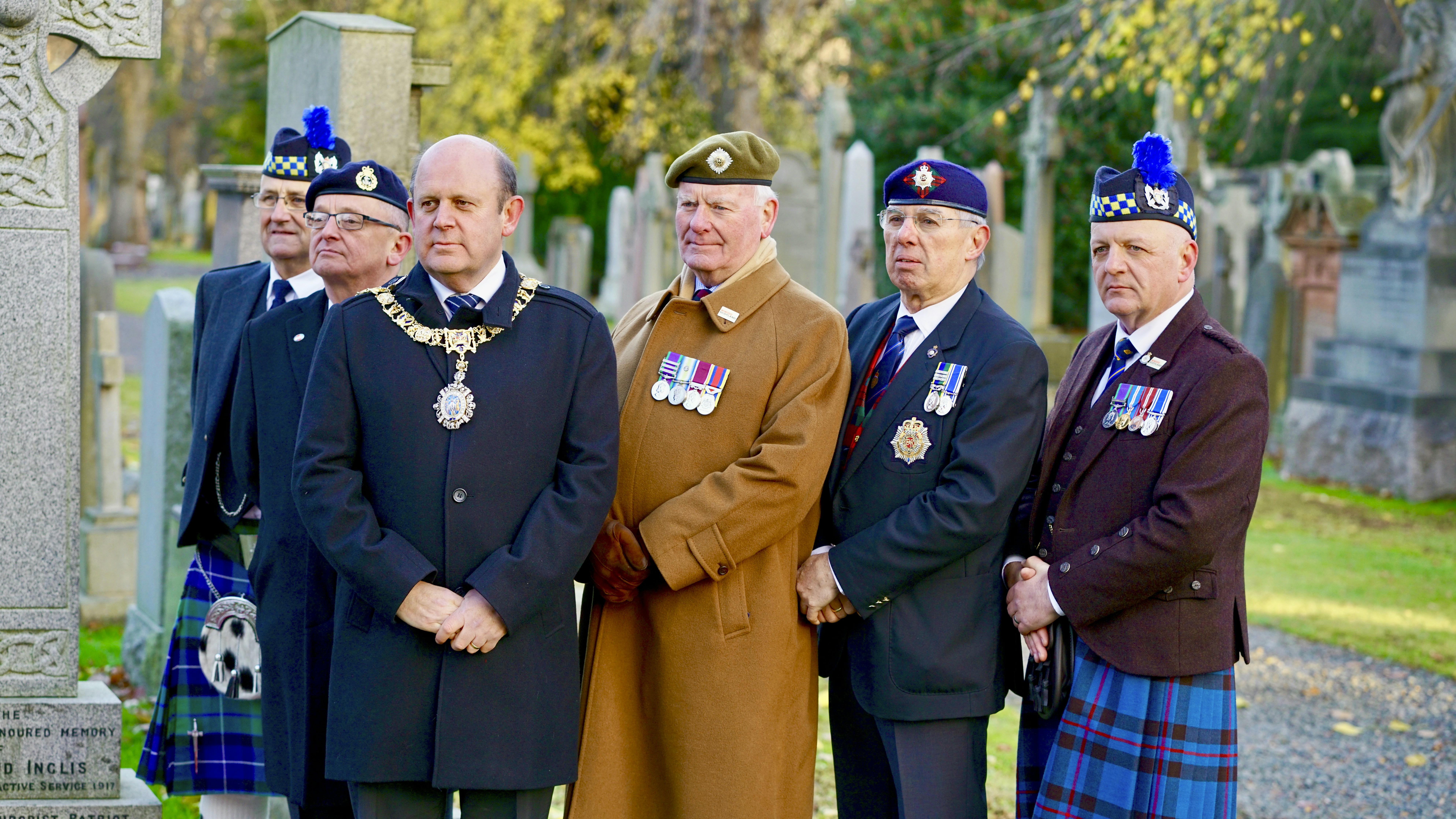 A group of men standing next to each other photo – Free Man Image on ...