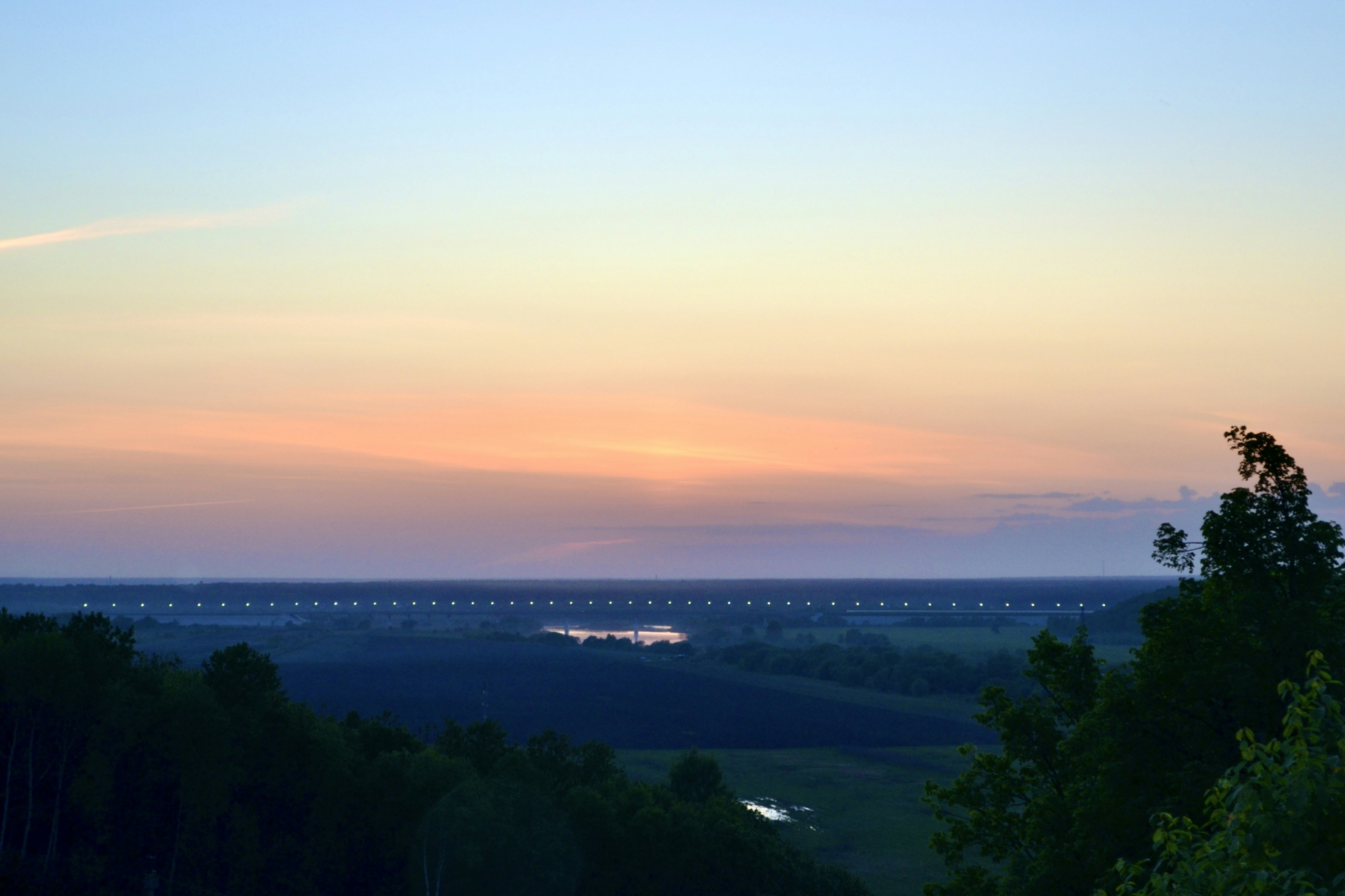 Dotted Horizon at Dusk: Lights Tracing the Valley
