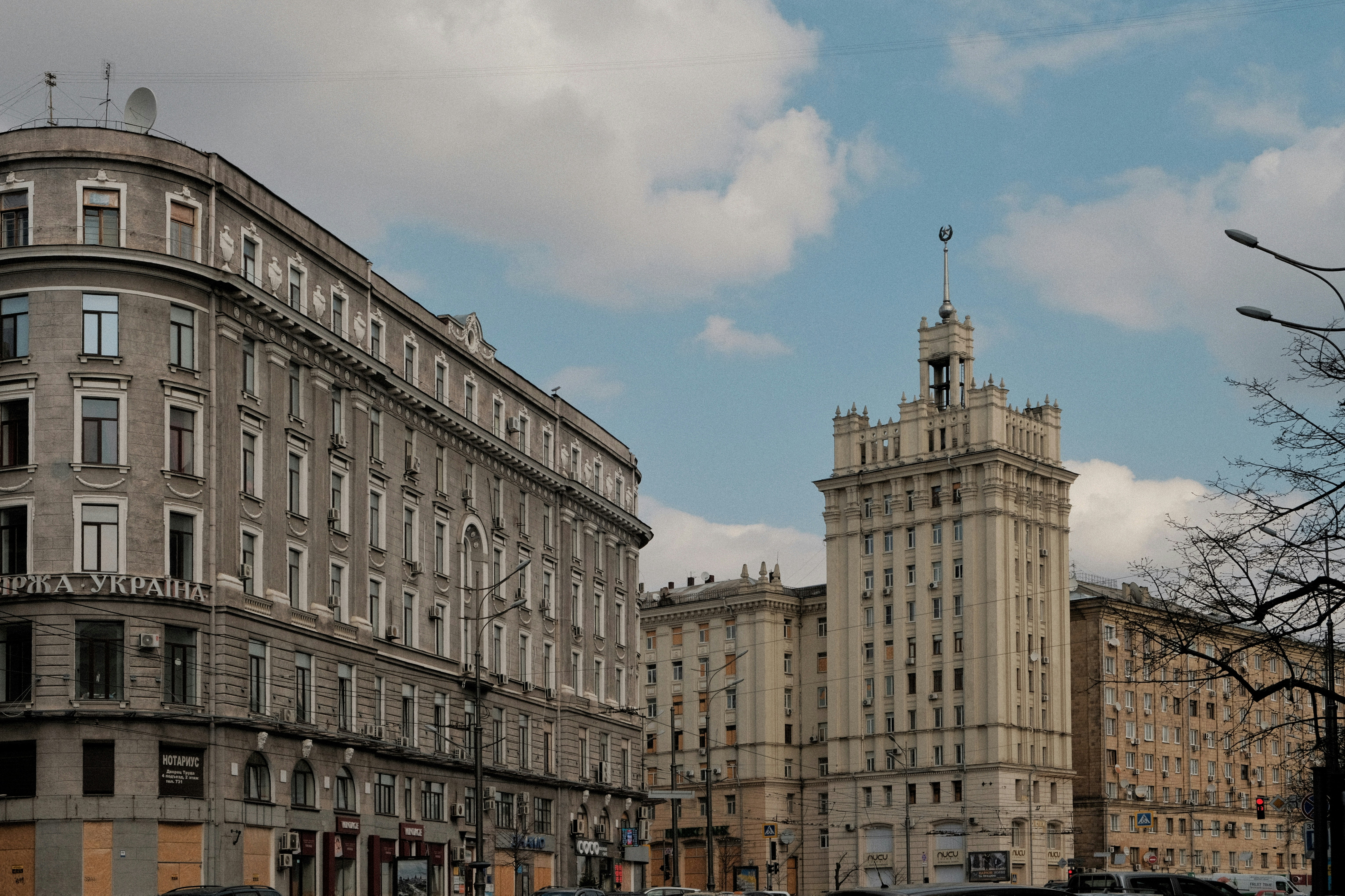 A very tall building with a clock on the top of it photo – Free Kharkiv ...