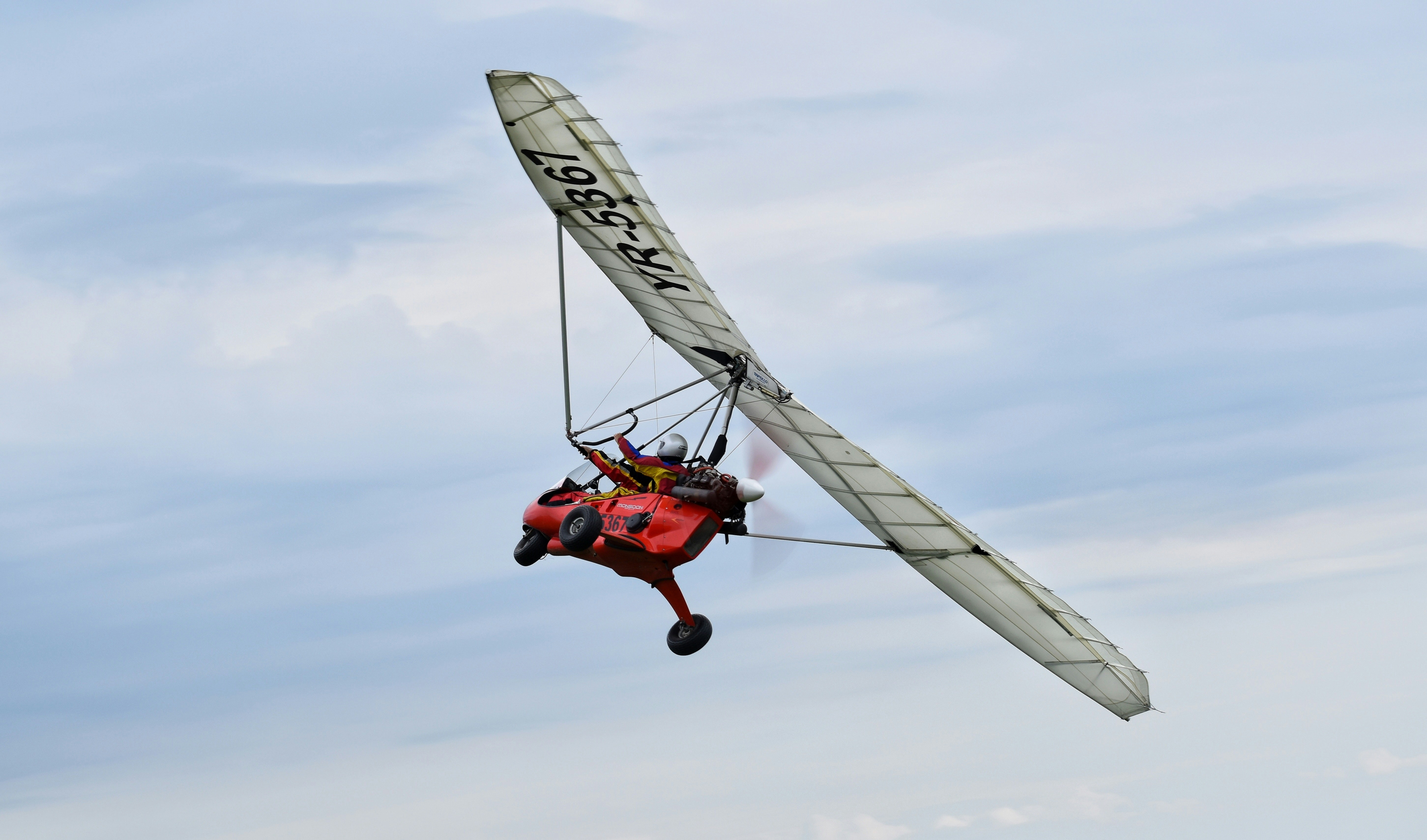 A person riding a hang glider in the air photo – Free Airplane Image on ...