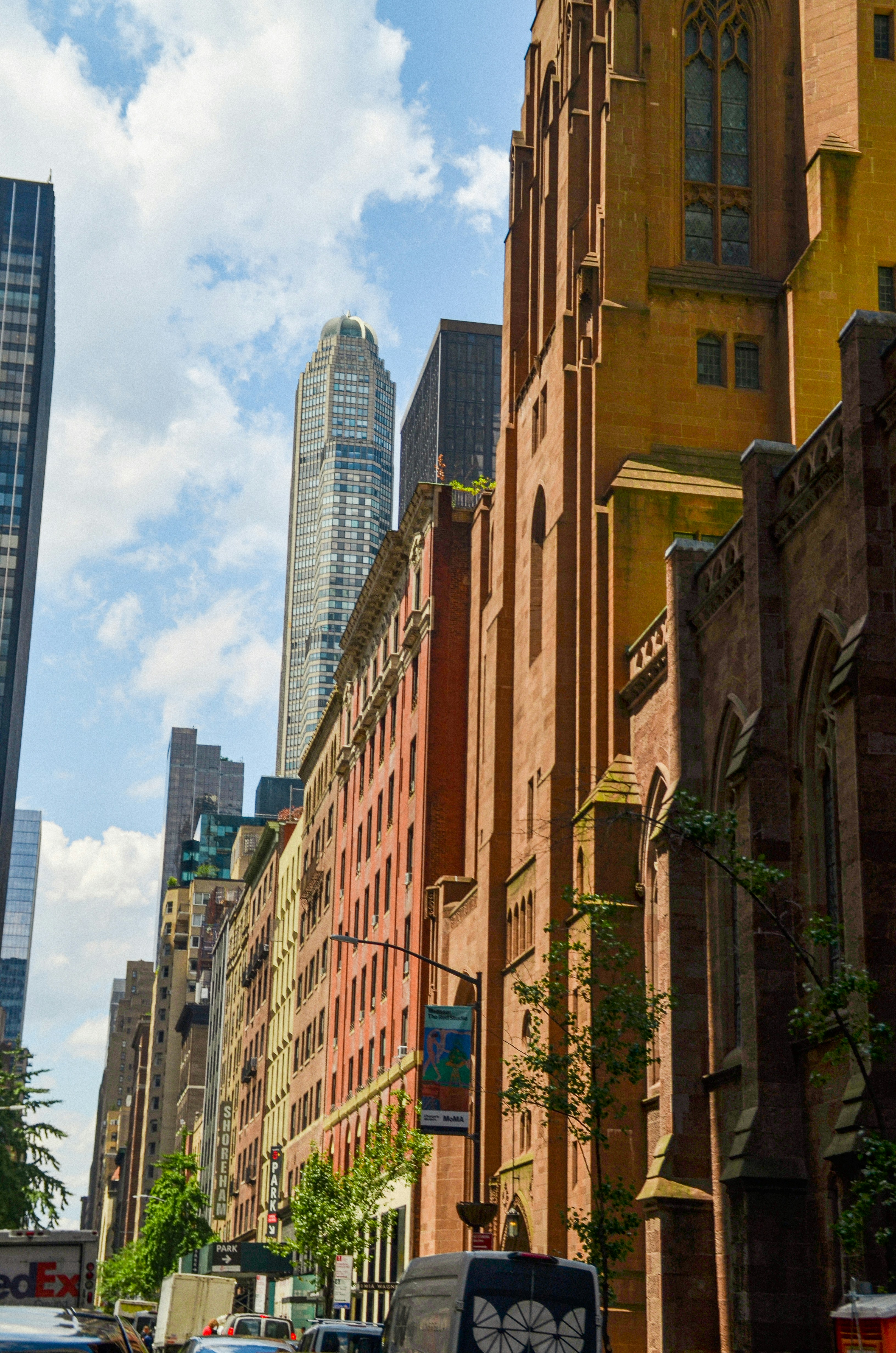 Redstone Avenue: Old Brick Facades Face a Glass Skyline