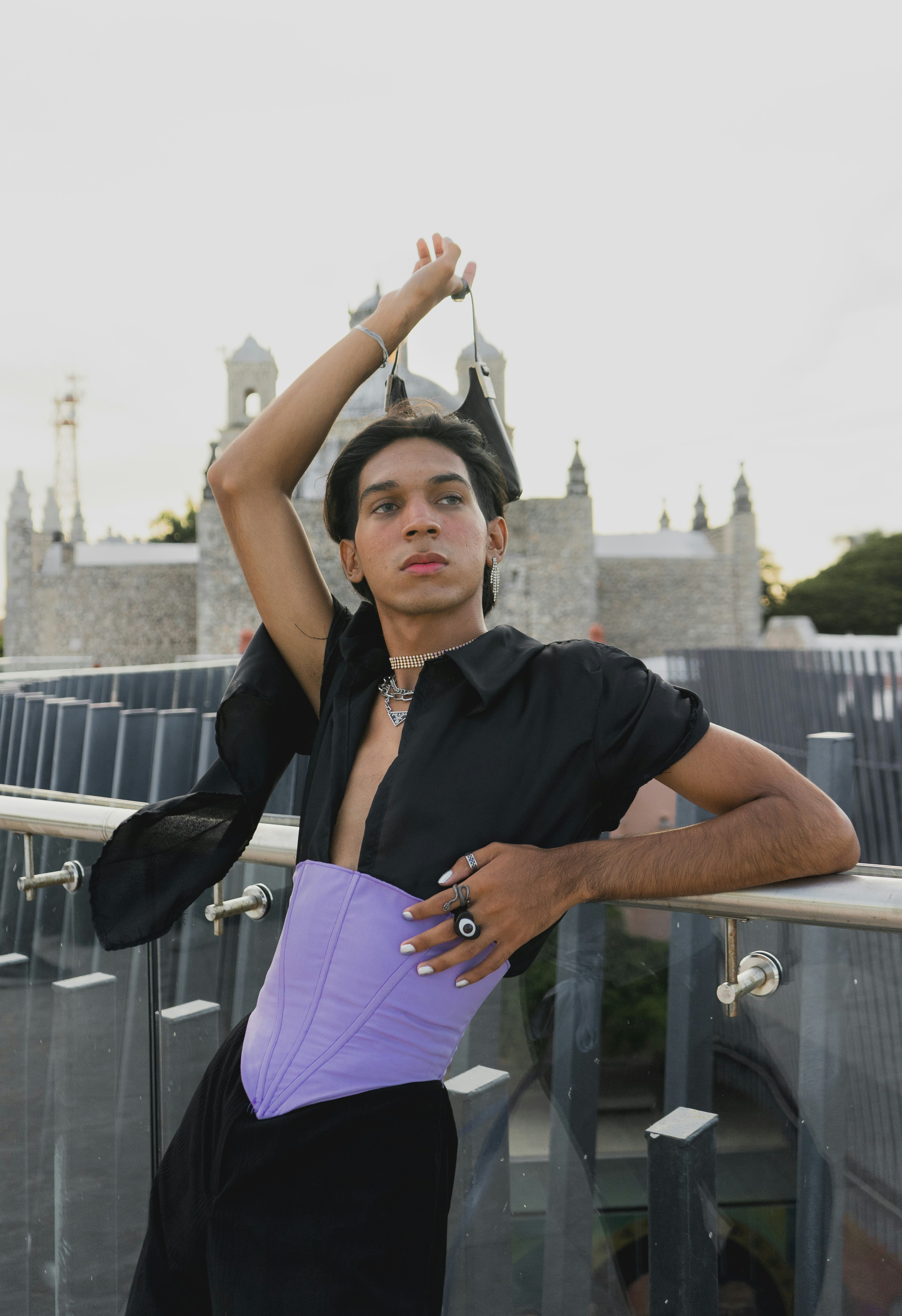 Elevated Poise on a Rooftop: A Portrait in Velvet Purple