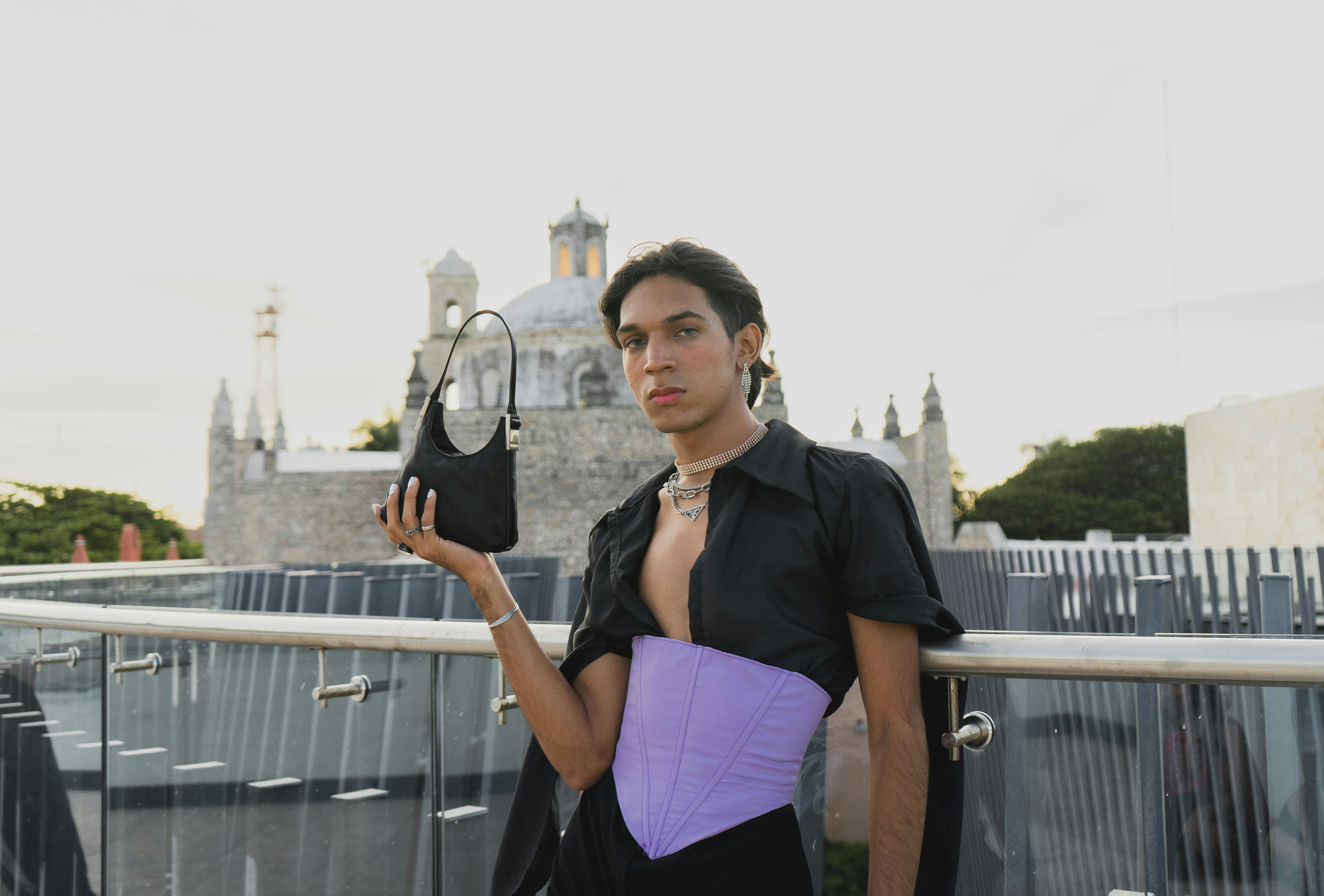 Midnight Violet: A poised silhouette against city rails