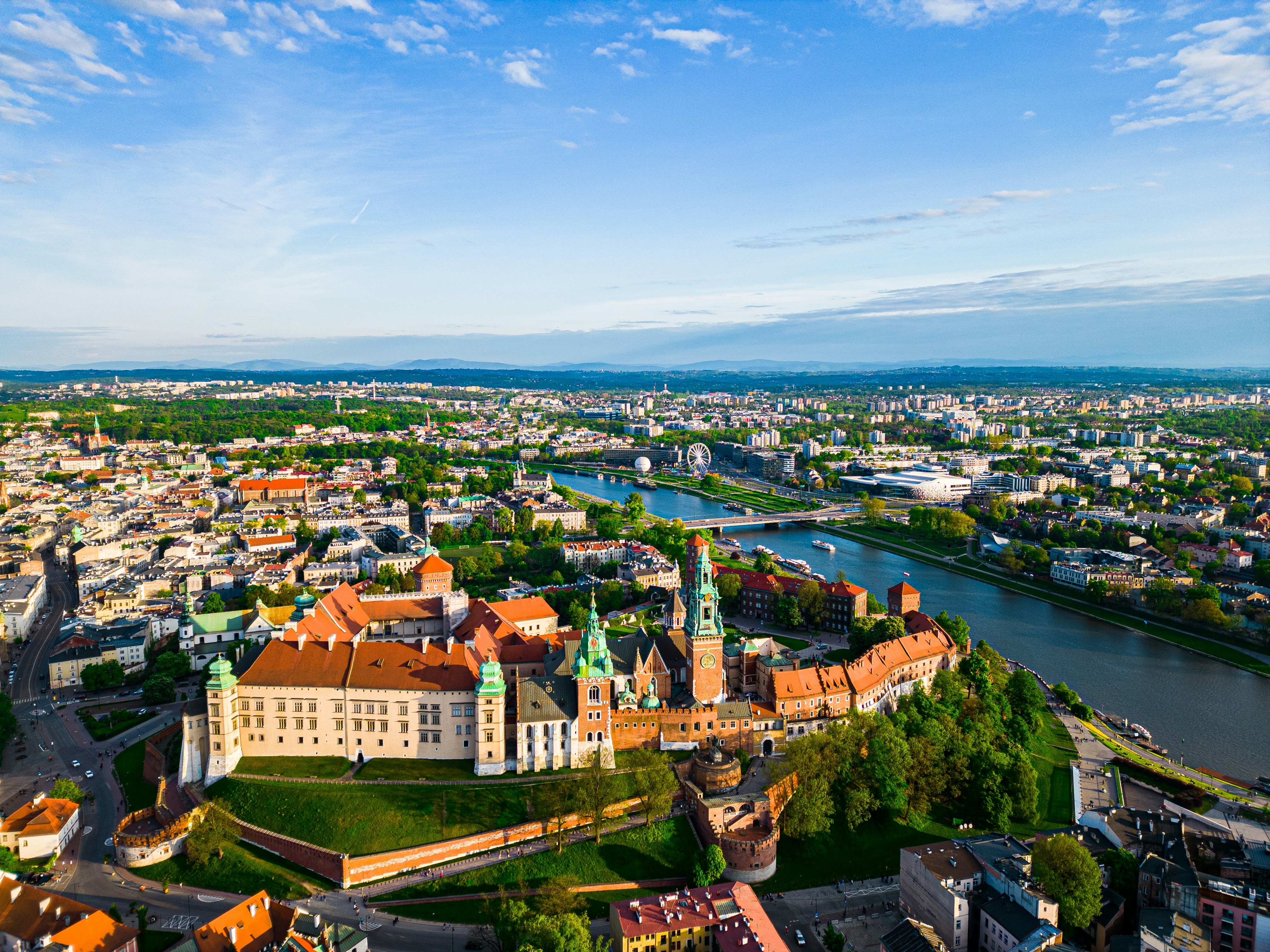 An aerial view of a city with a river running through it photo – Free ...