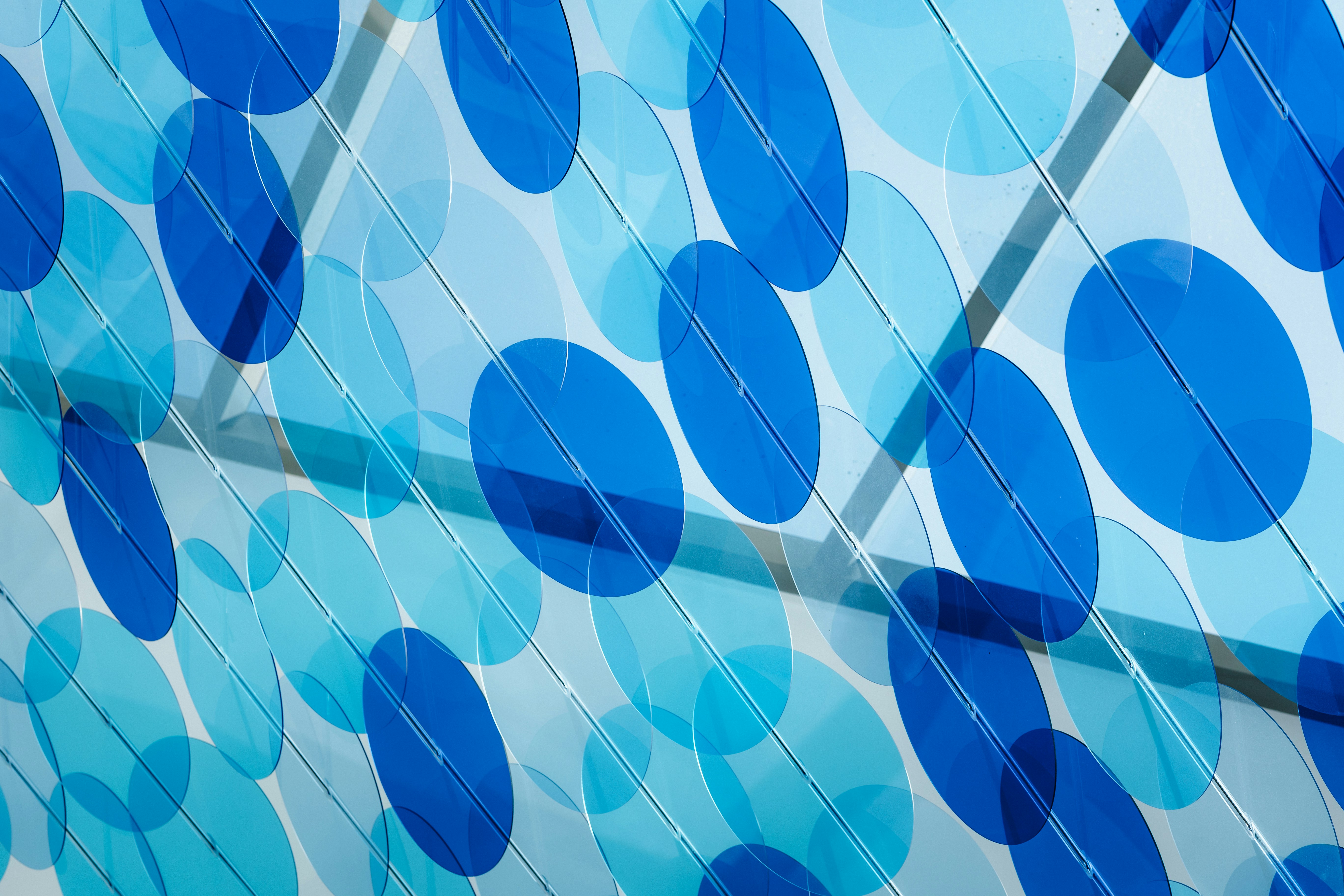 Blue Orbits on Glass: A Geometric Play of Circles and Lines