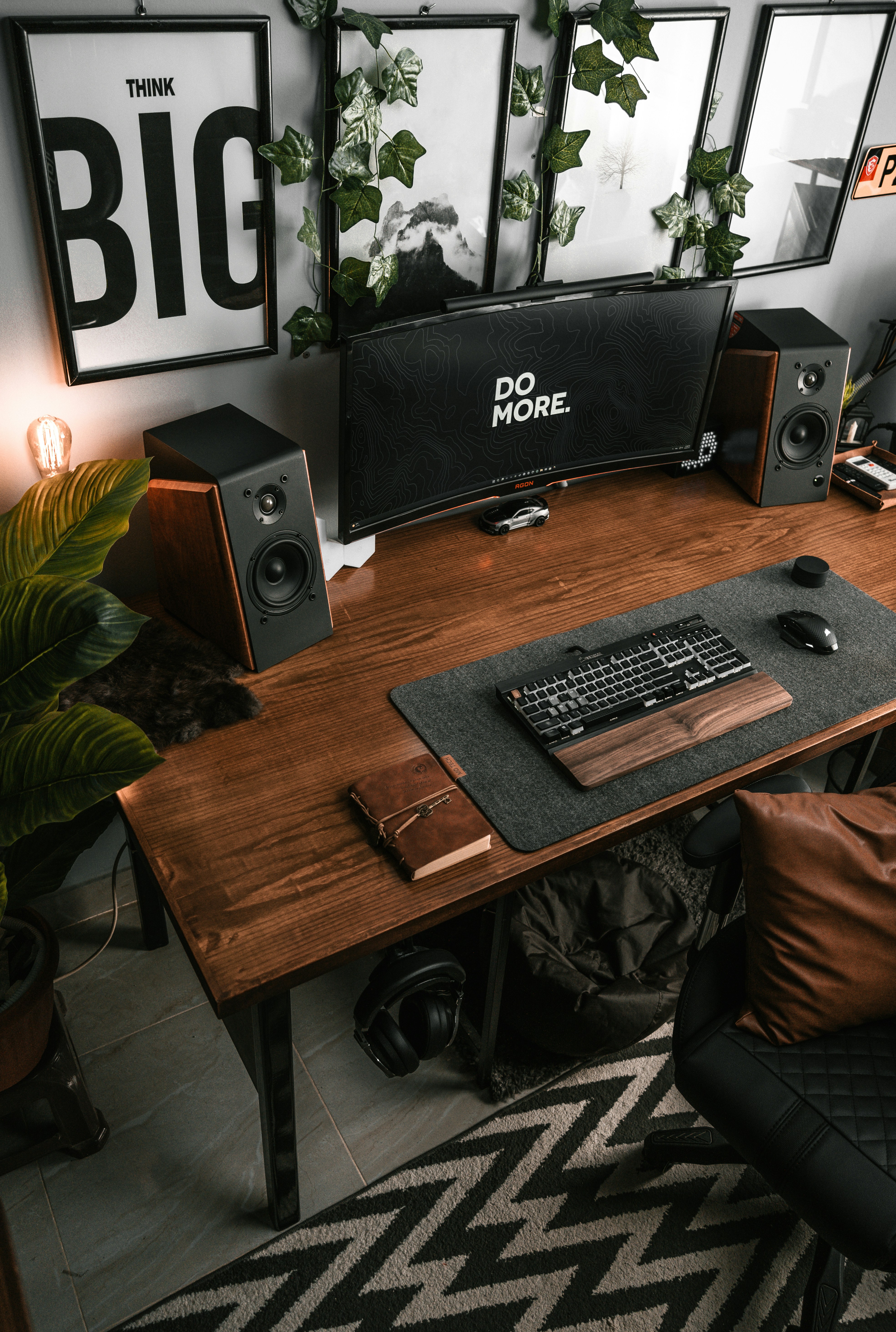 A computer desk with a keyboard and speakers photo – Free Table Image ...