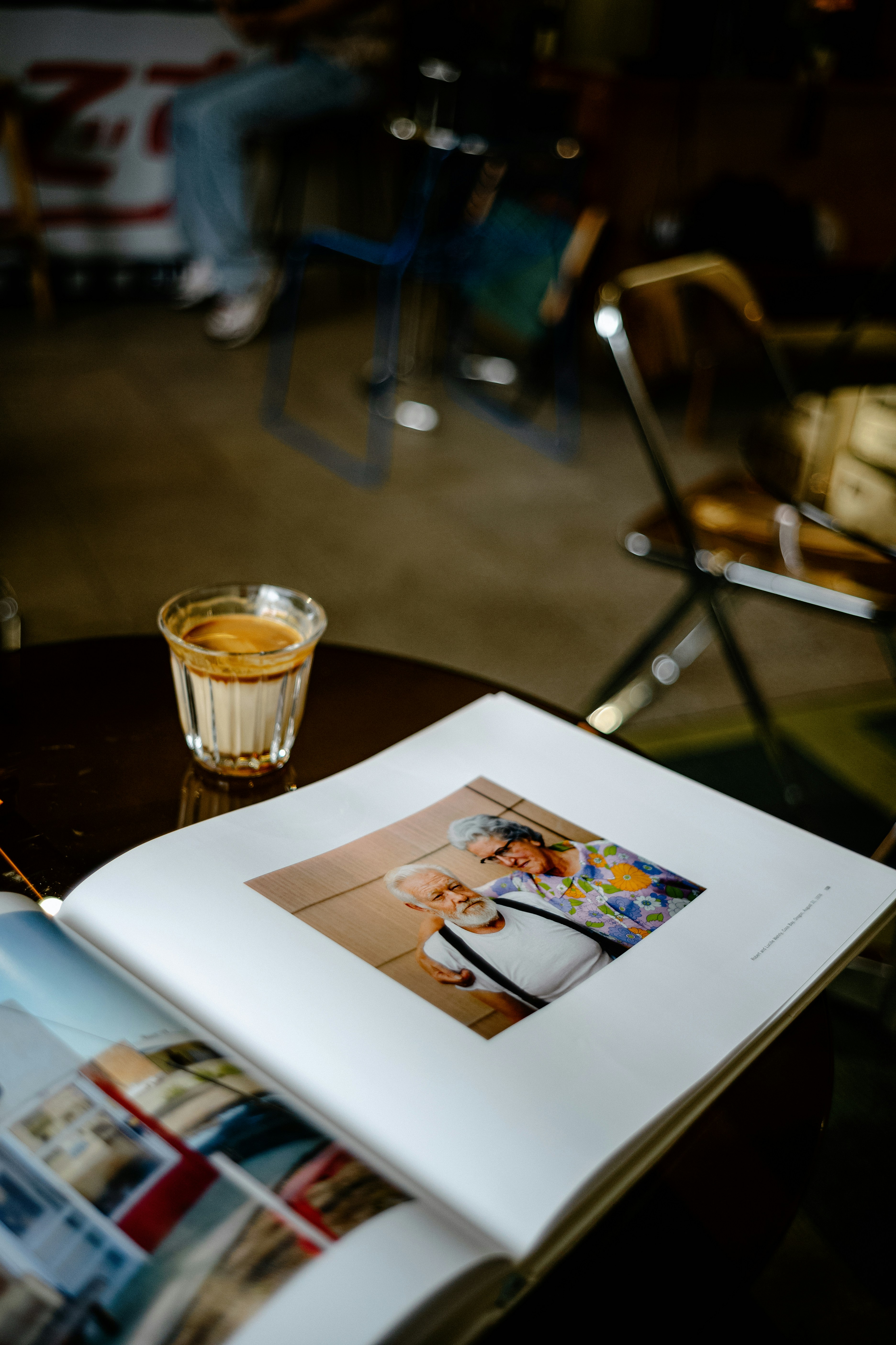 Pages in Focus: A Quiet Café Moment with a Cherished Photo