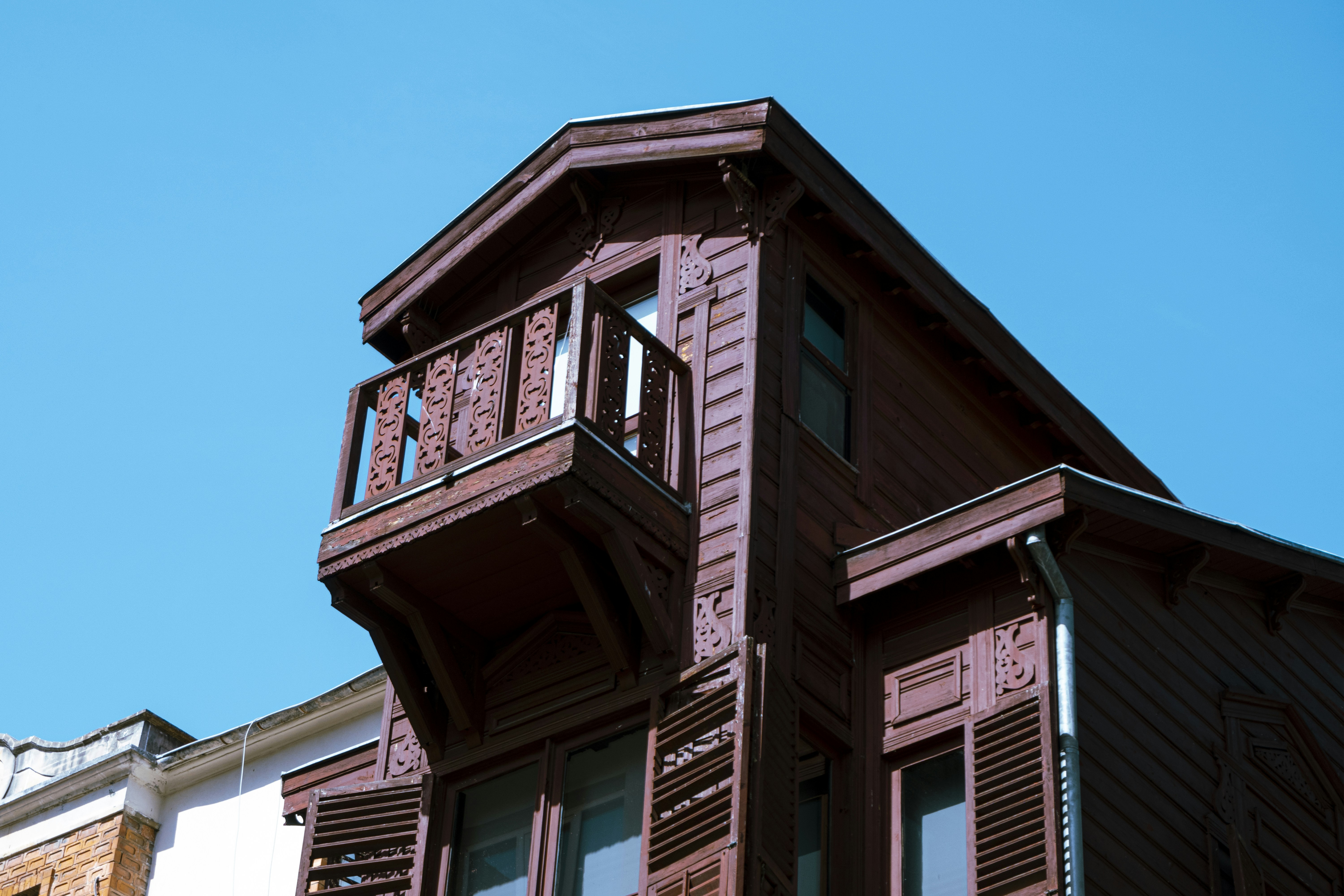 Timber Balcony Tower Reaching Toward a Cerulean Sky