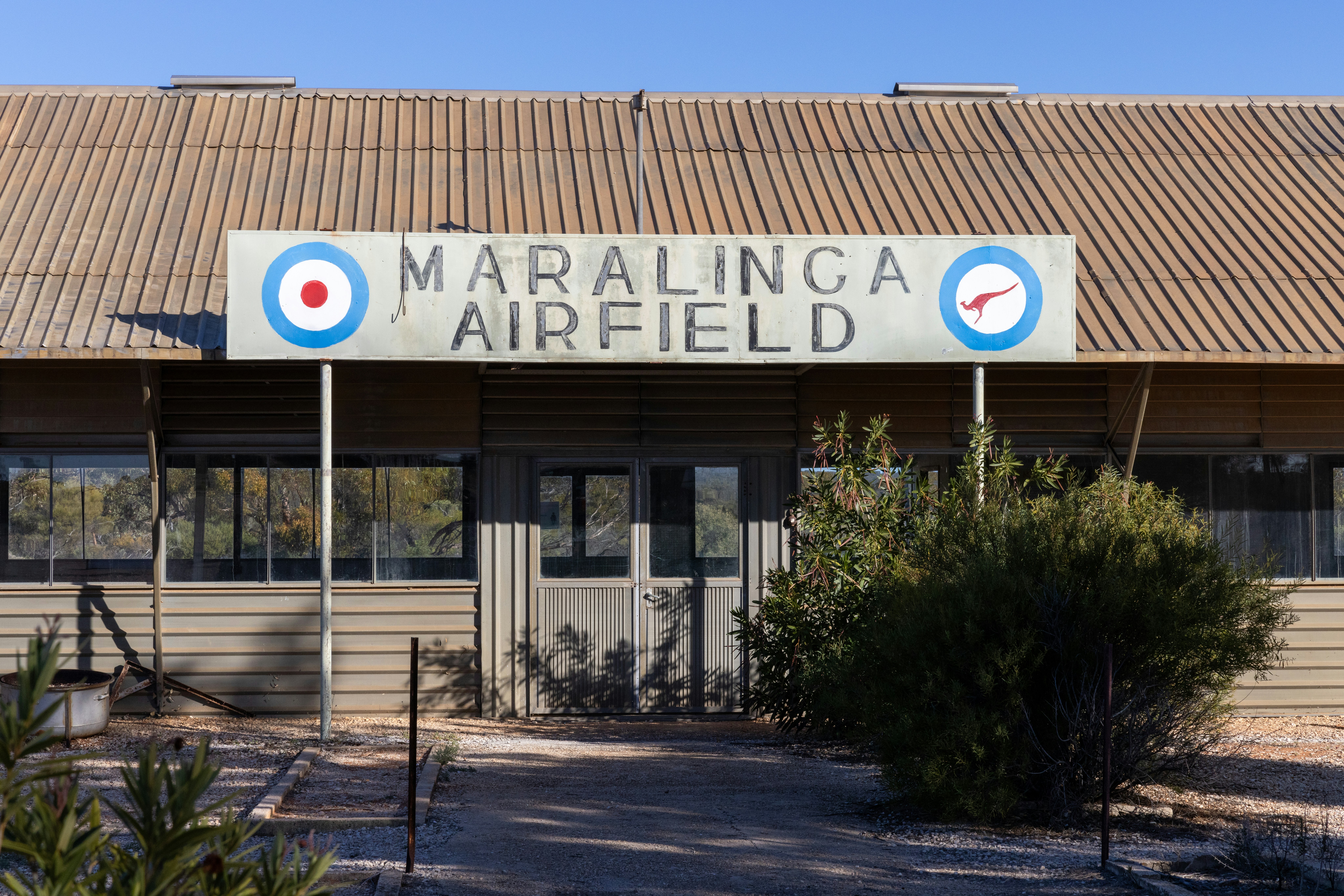A building with a sign that says marblinga airfield photo – Free ...