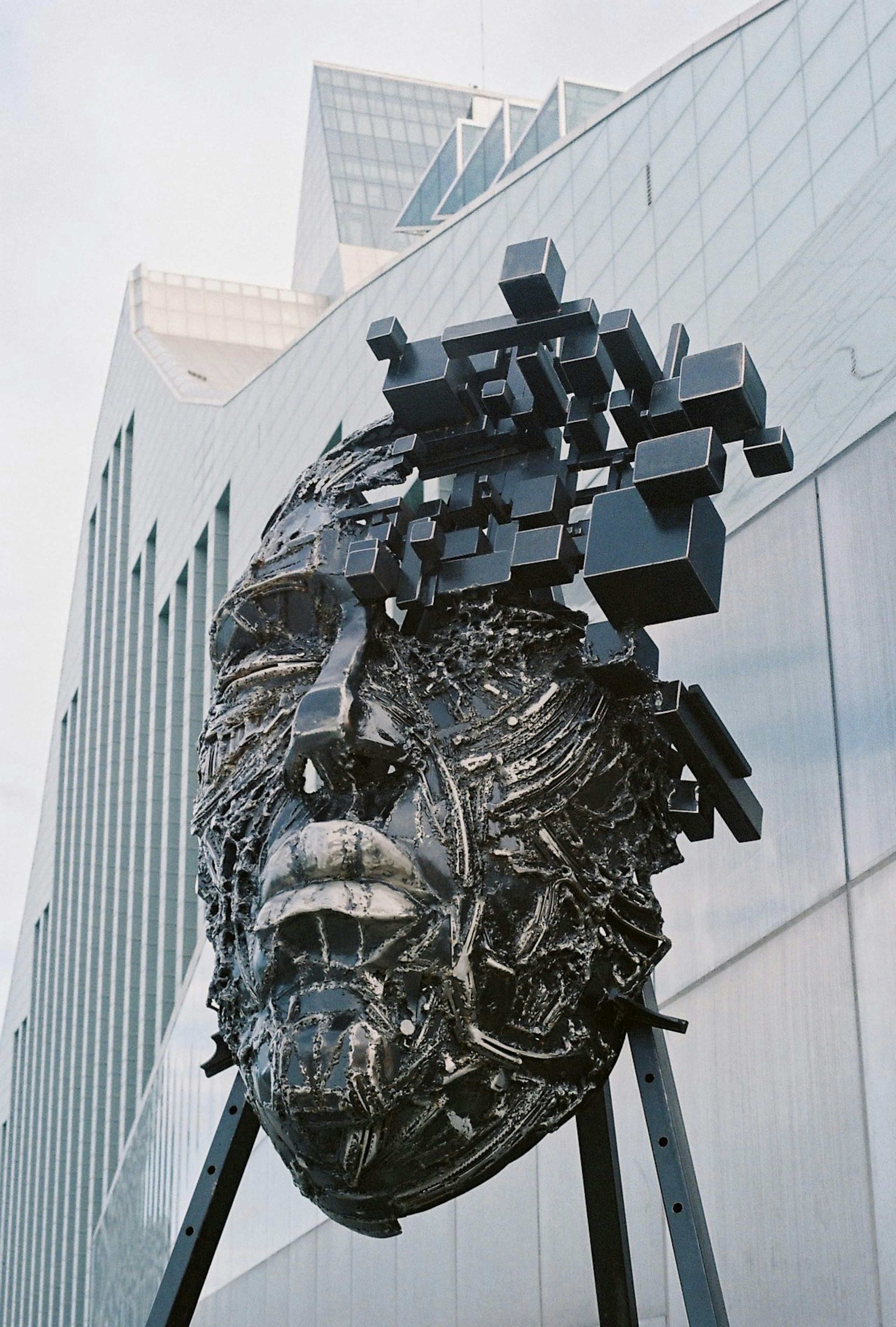 A sculpture of a human head with cubes on it photo – Free Latvijas ...