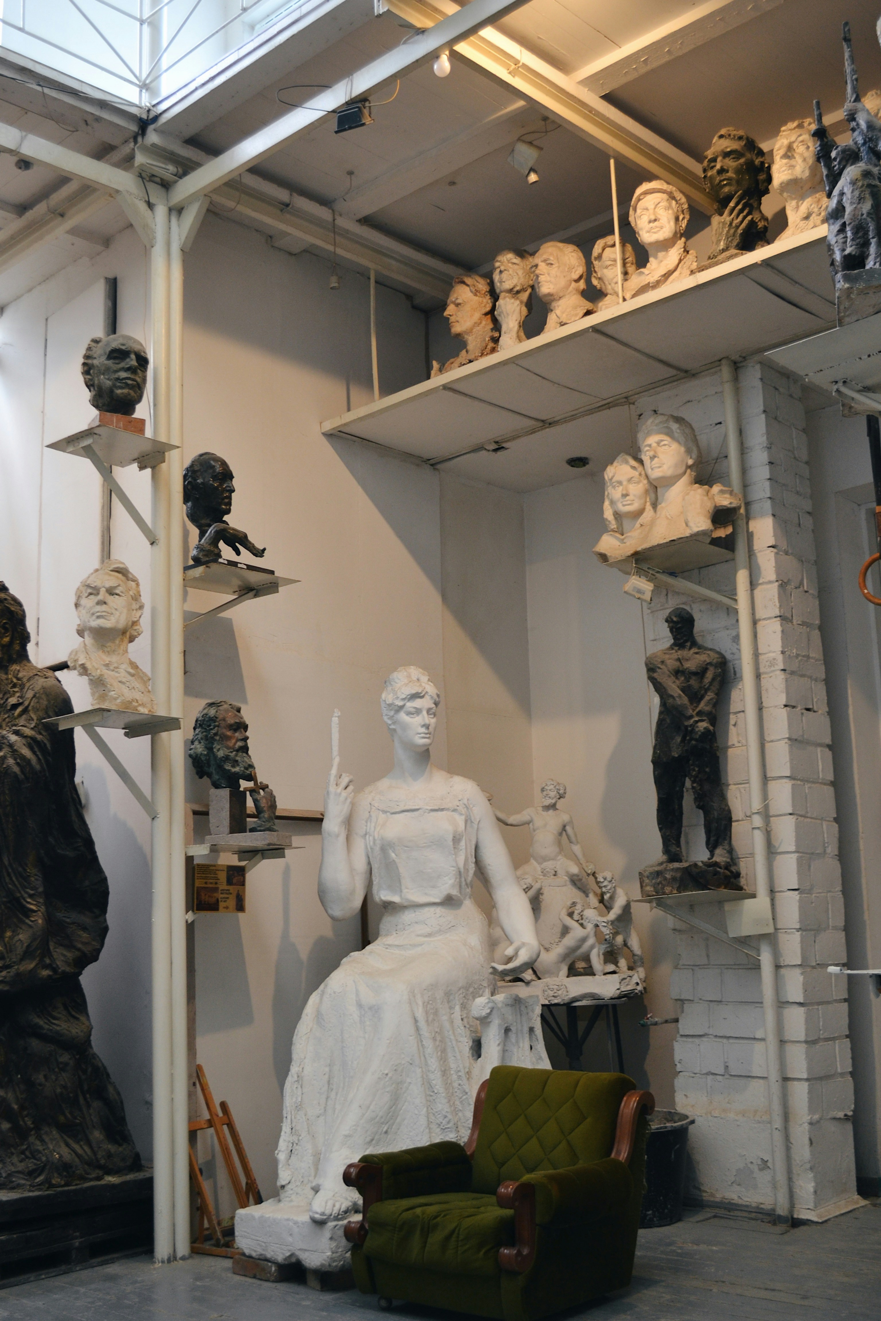 A room filled with lots of different types of statues photo – Free Київ ...