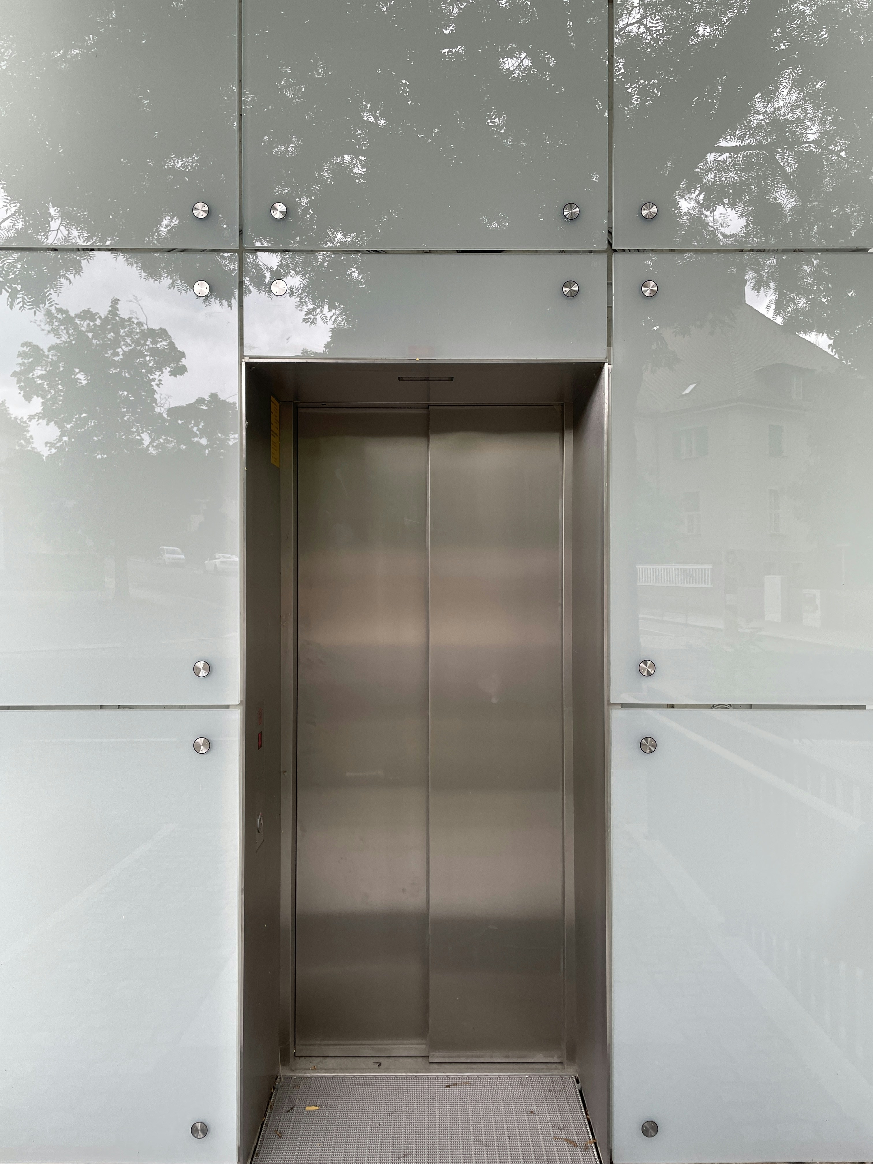 An open metal door in front of a white wall photo – Free Indoors Image ...