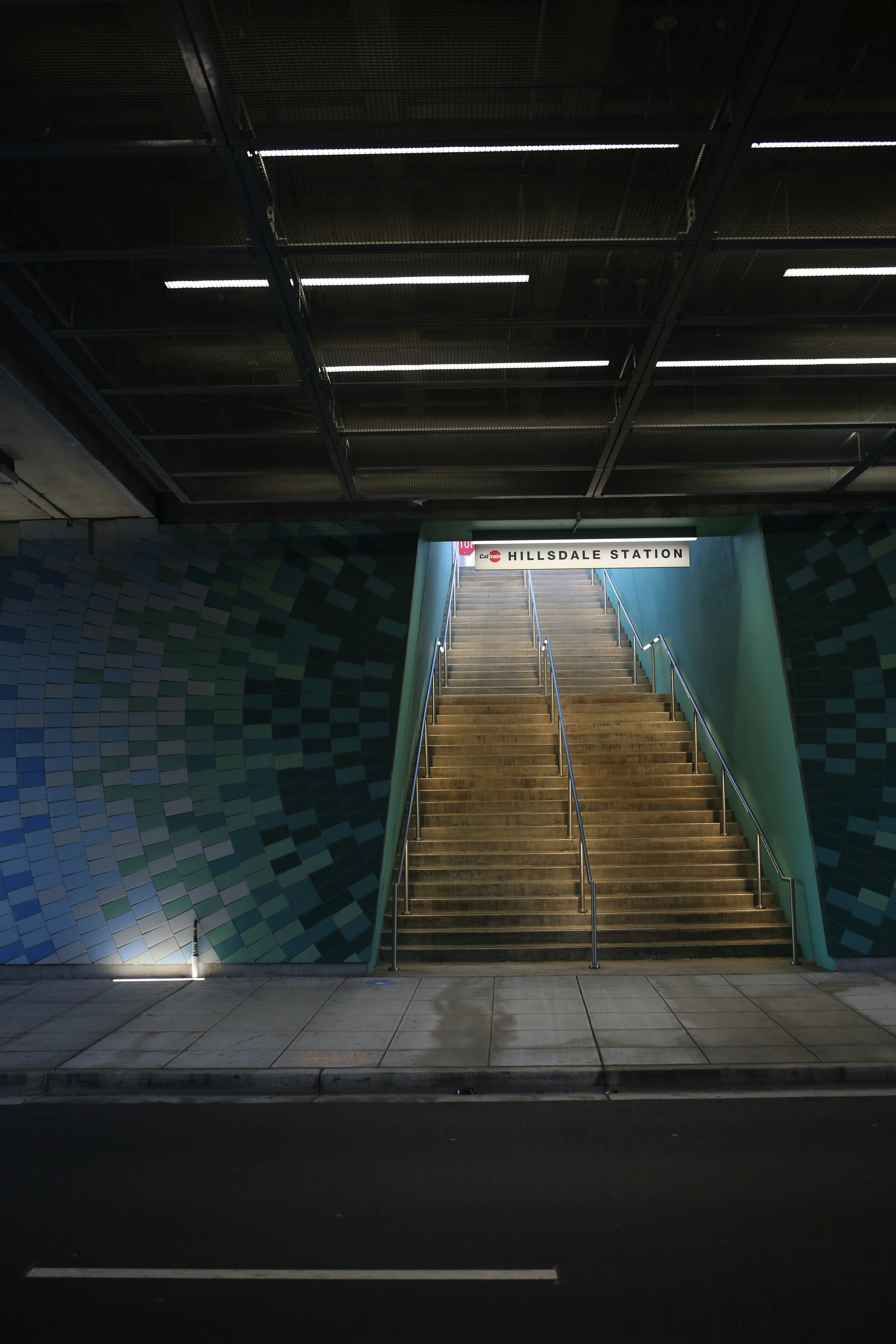 A set of stairs leading up to the top of a flight of stairs photo ...